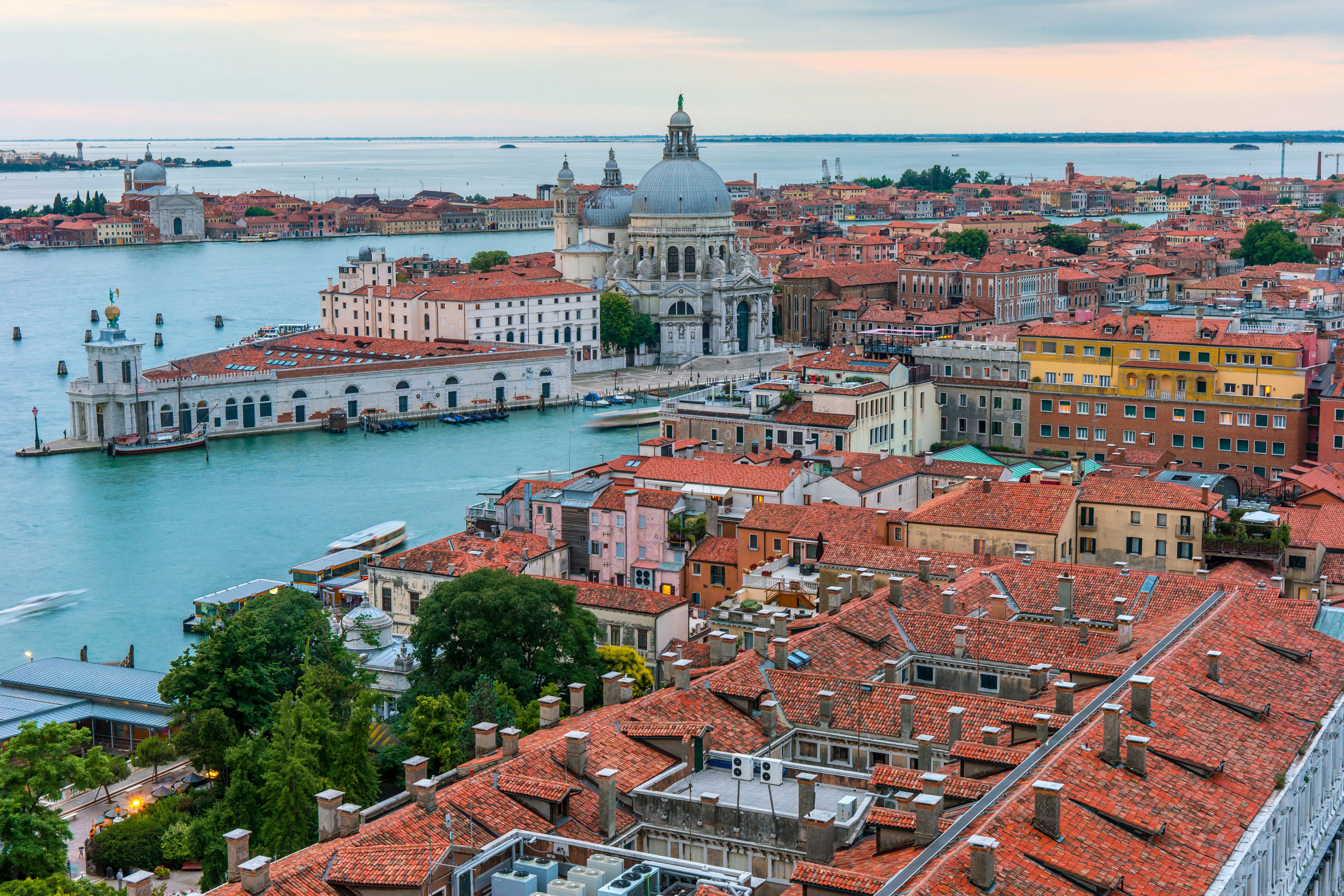 Venezian Panorama: The Grand Canal and Basilica Amid Terracotta Rooftops