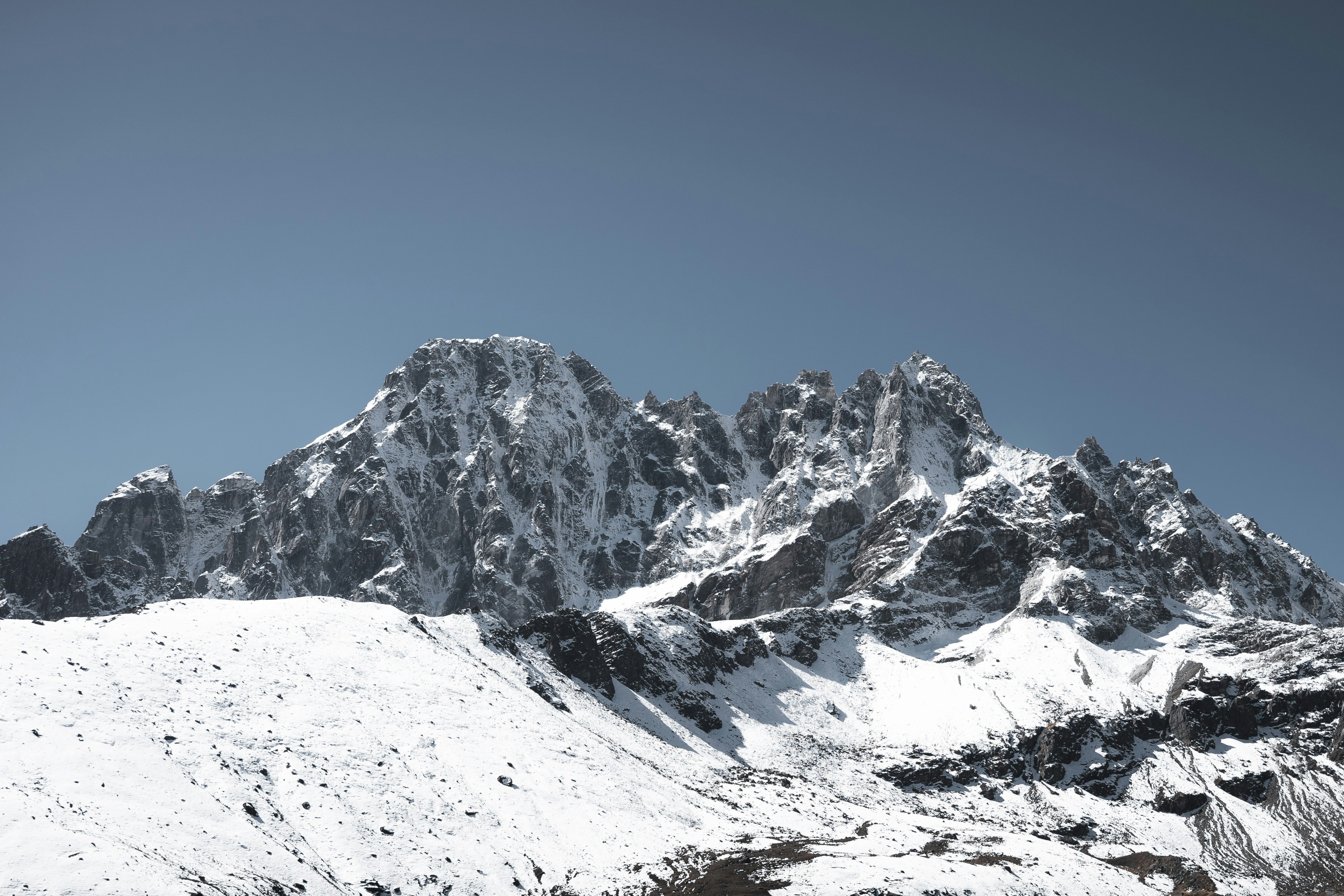 Snowclad Peaks Under a Clear Blue Vellum