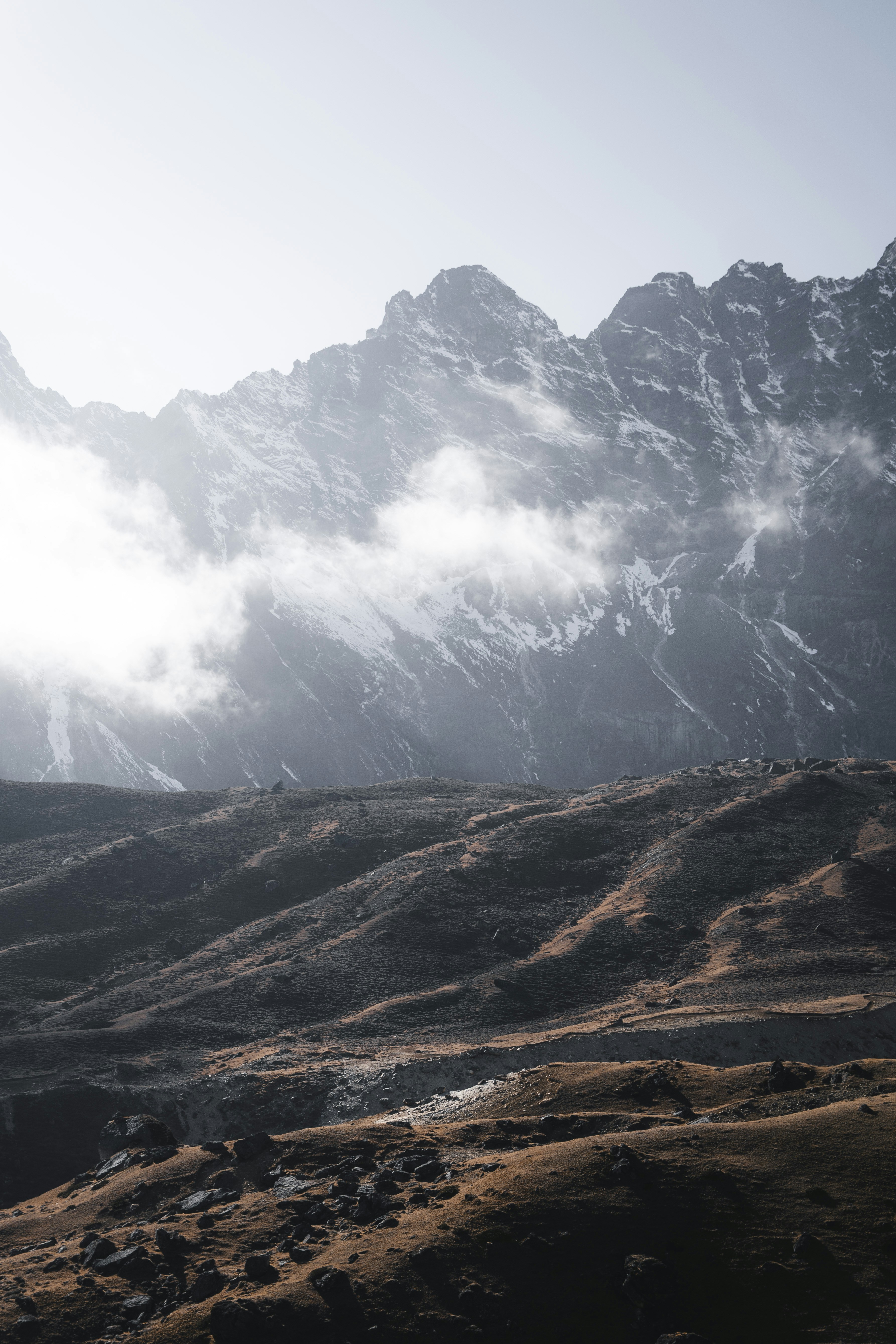 Snow-topped Peaks Soaring Over Desert Ridges