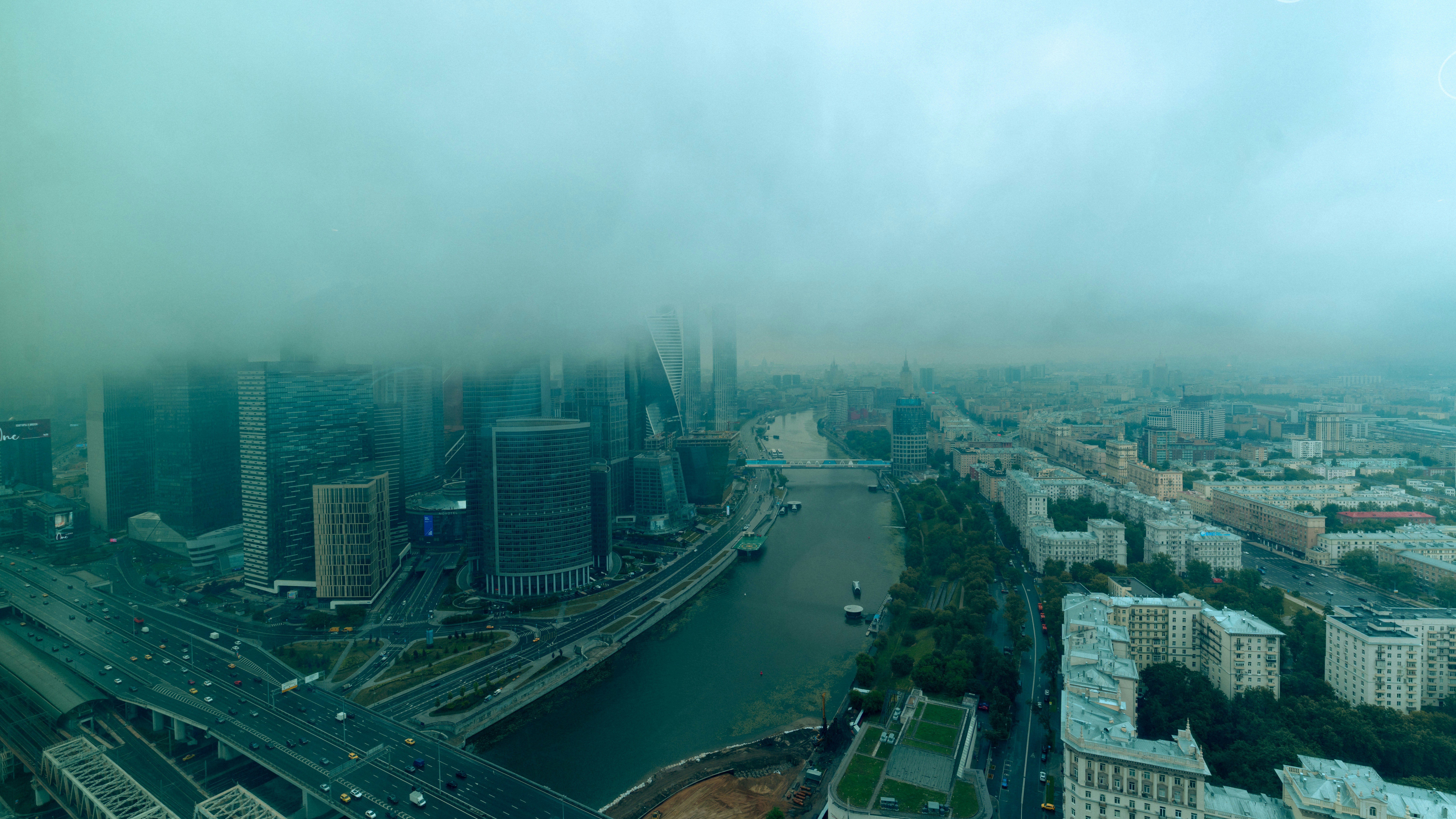 Riverbend Skyline Under Morning Mist