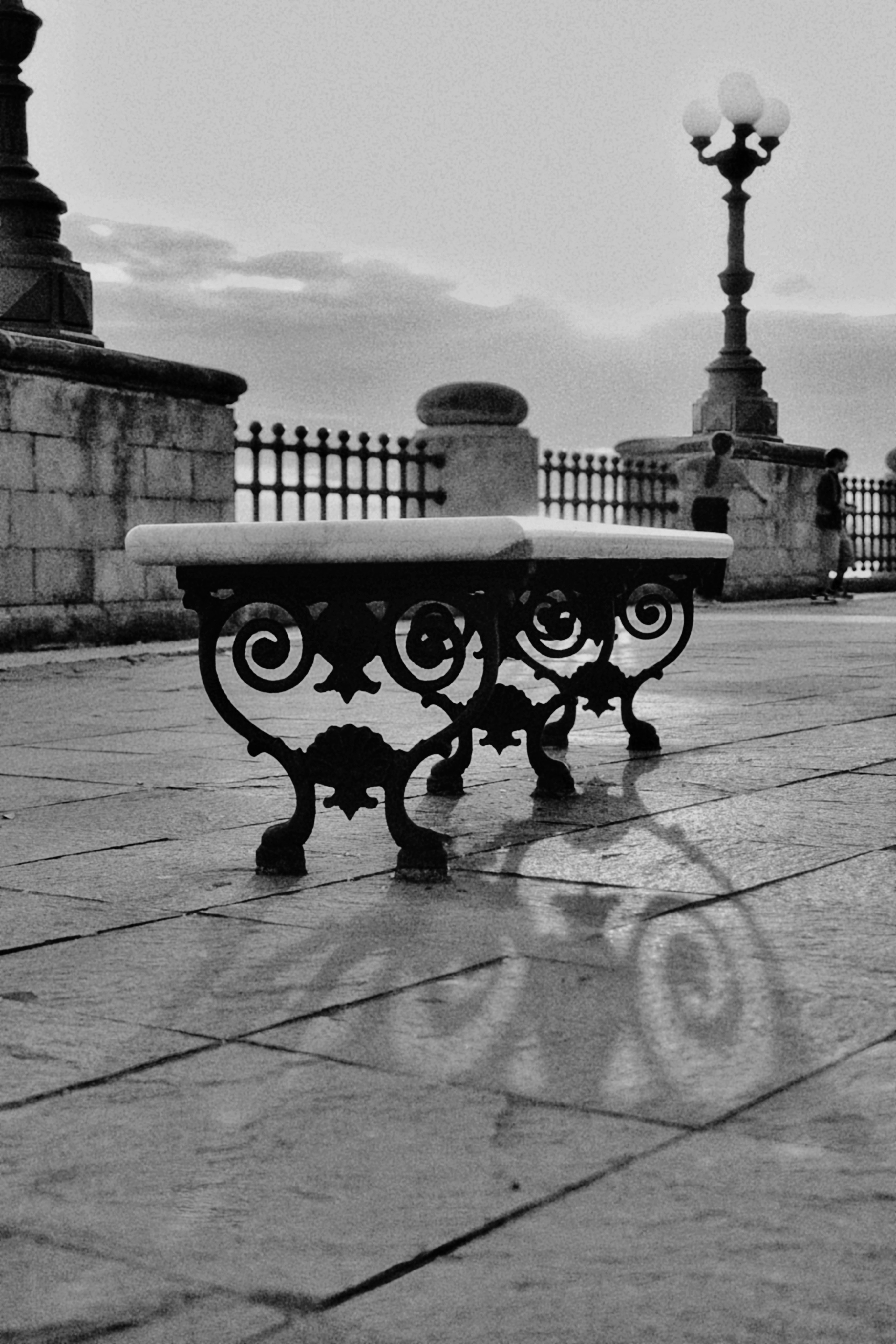 Iron Bench in Silhouette at the Pier