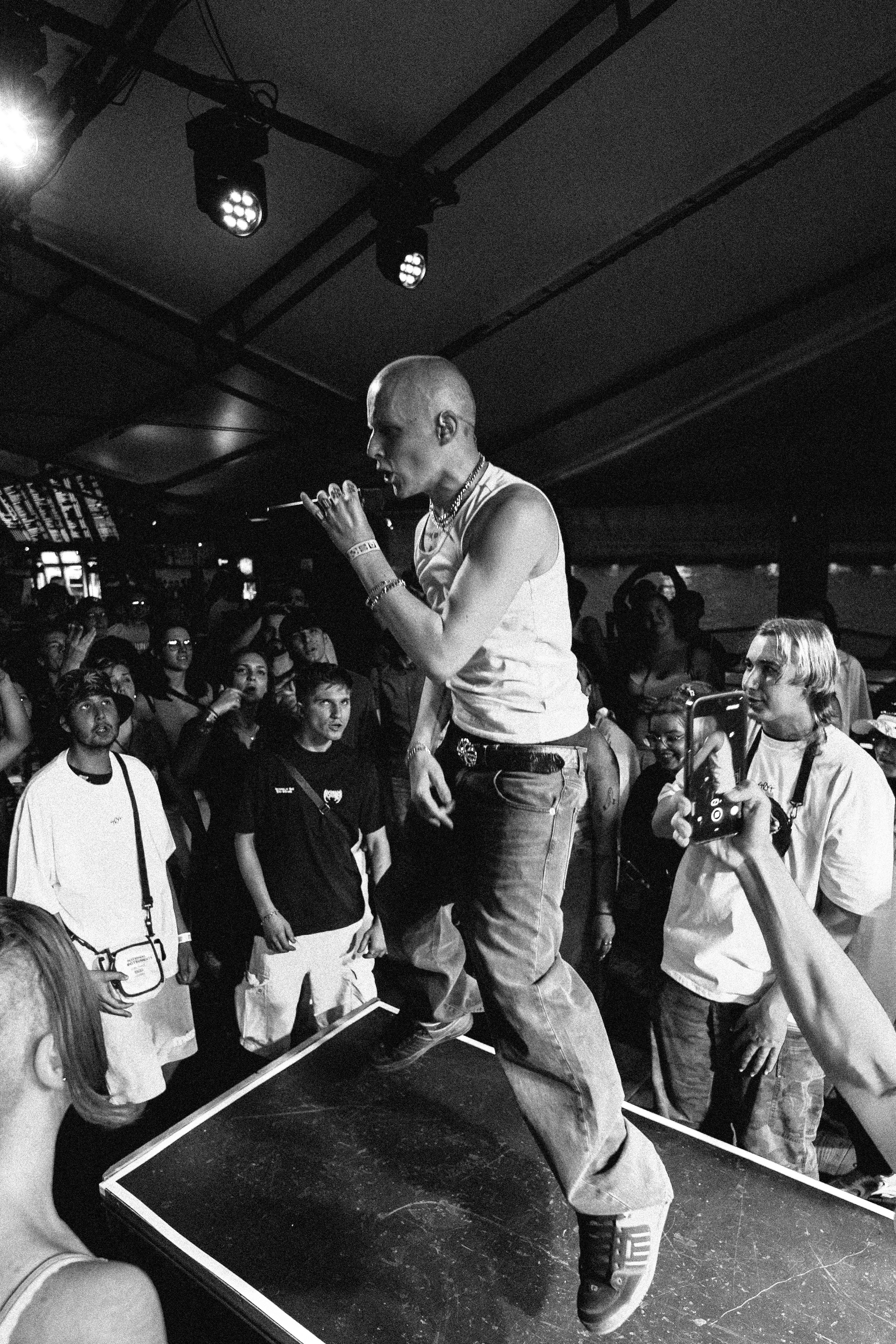 Midfield Microphone: A Performer Commands the Stage from a Raised Platform