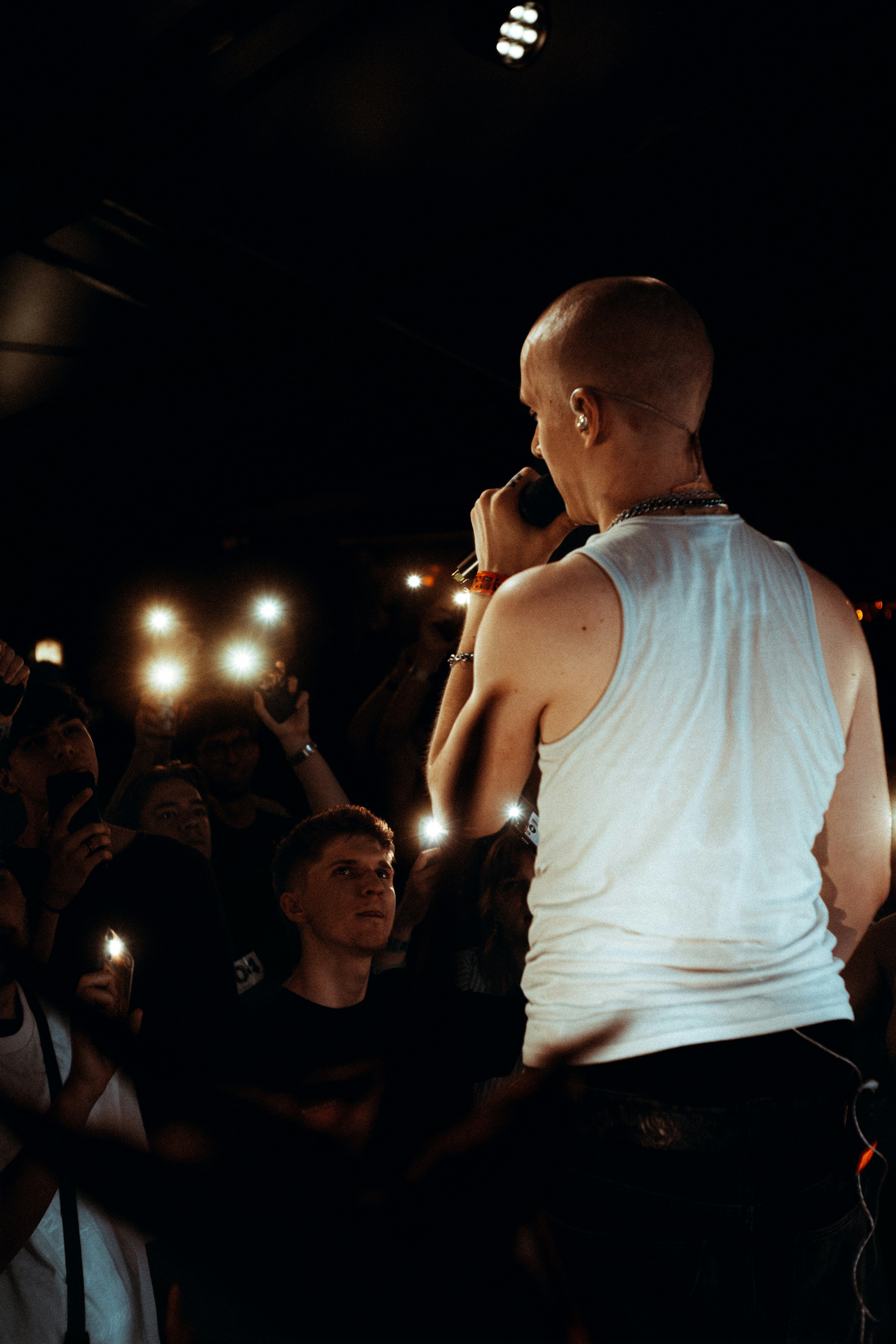 Vocal Spotlight: The Lead Singer in a Midnight Crowd