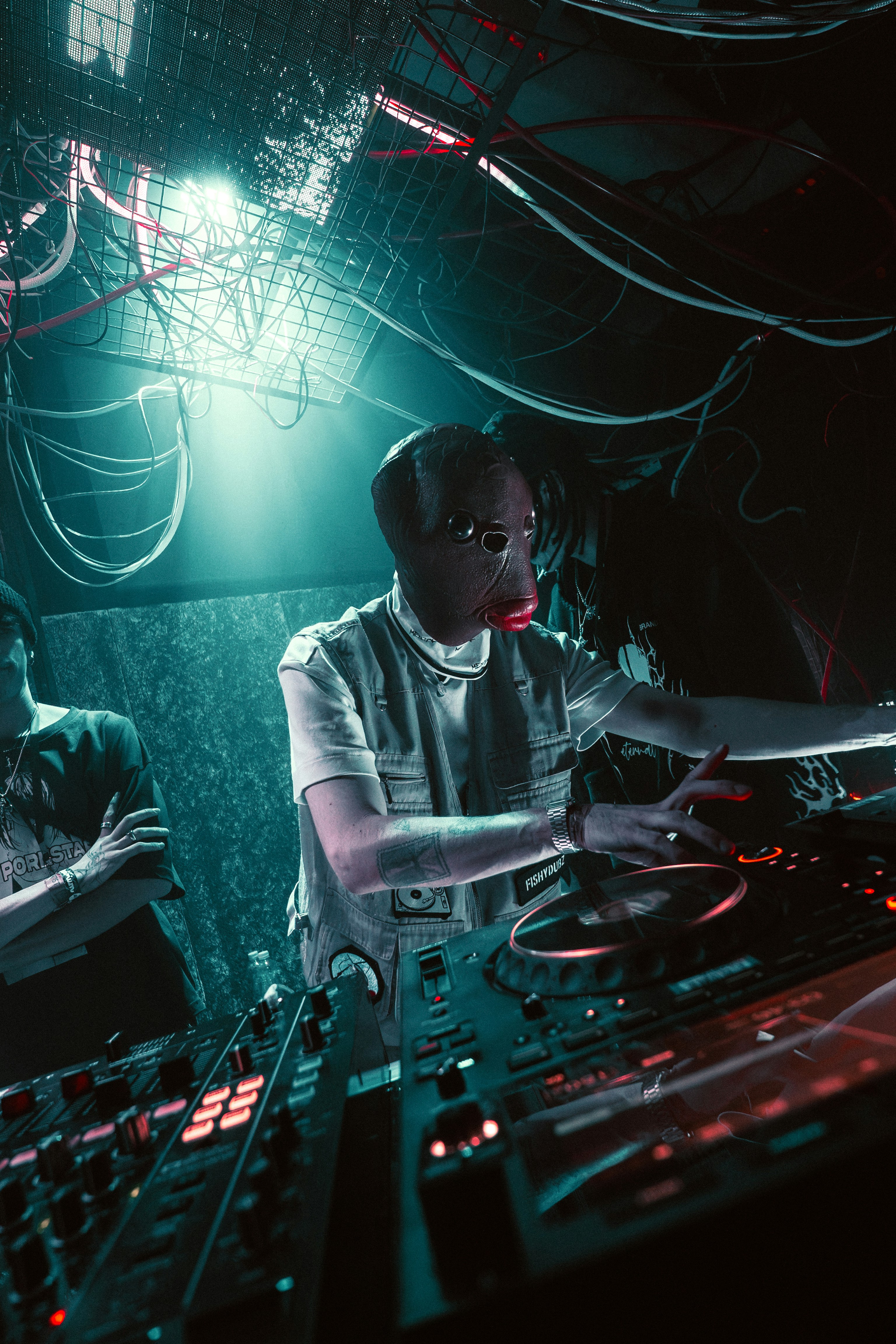 Masked DJ in Neon Rivers: A Night of Circuitry and Rhythm