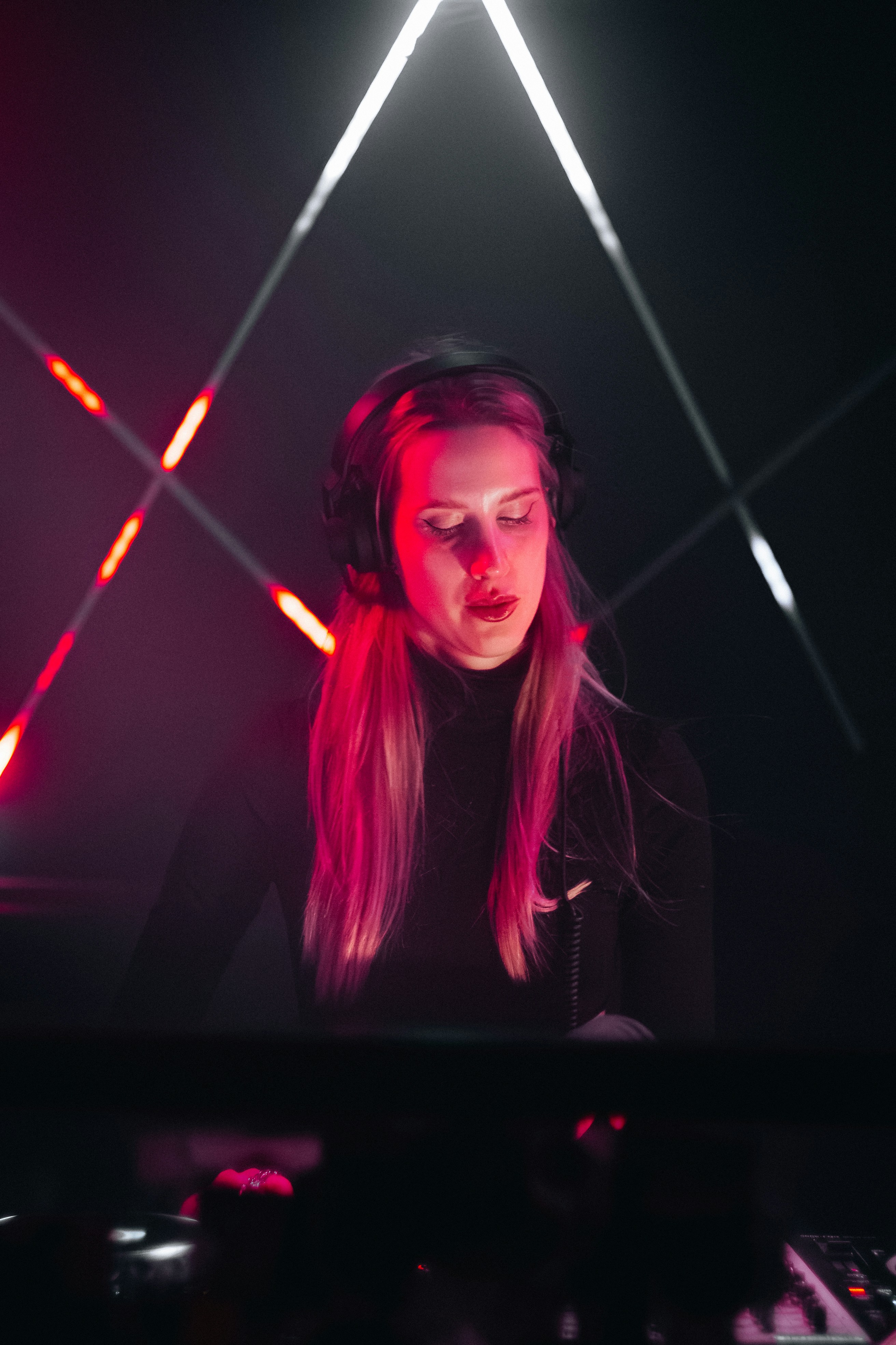 Neon Focus: A DJ in a Velvet Night