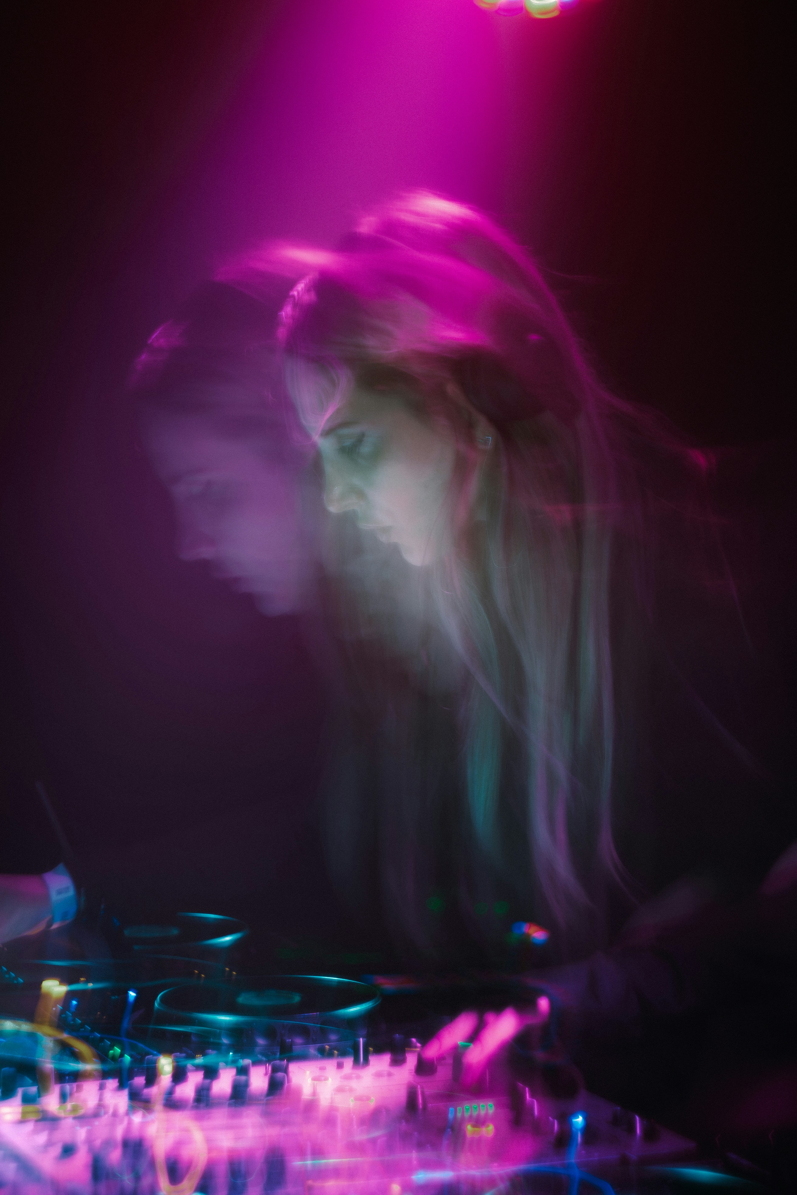 Blurred Pulse: A DJ in Neon Veil