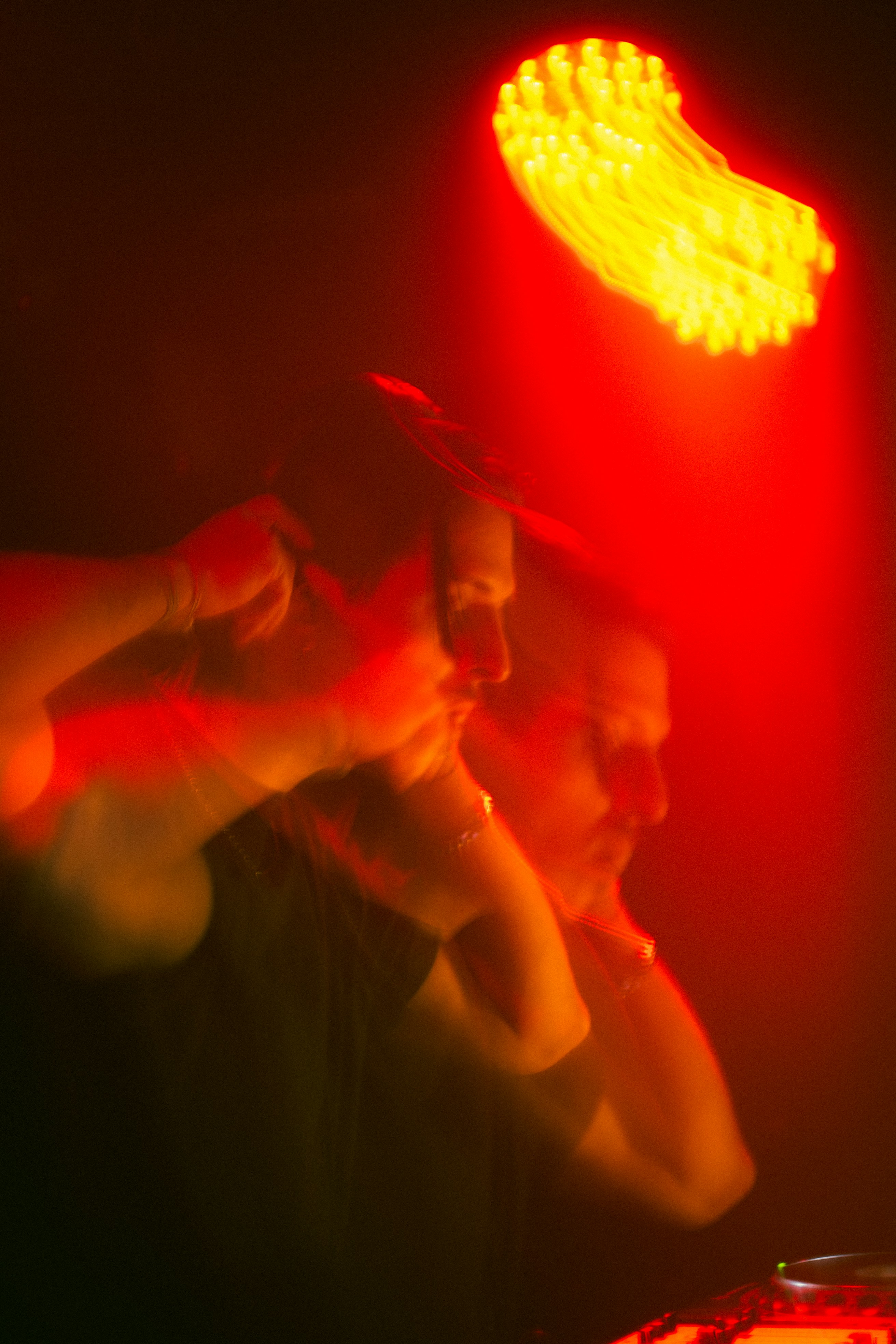Red Reverie: A DJ in Motion