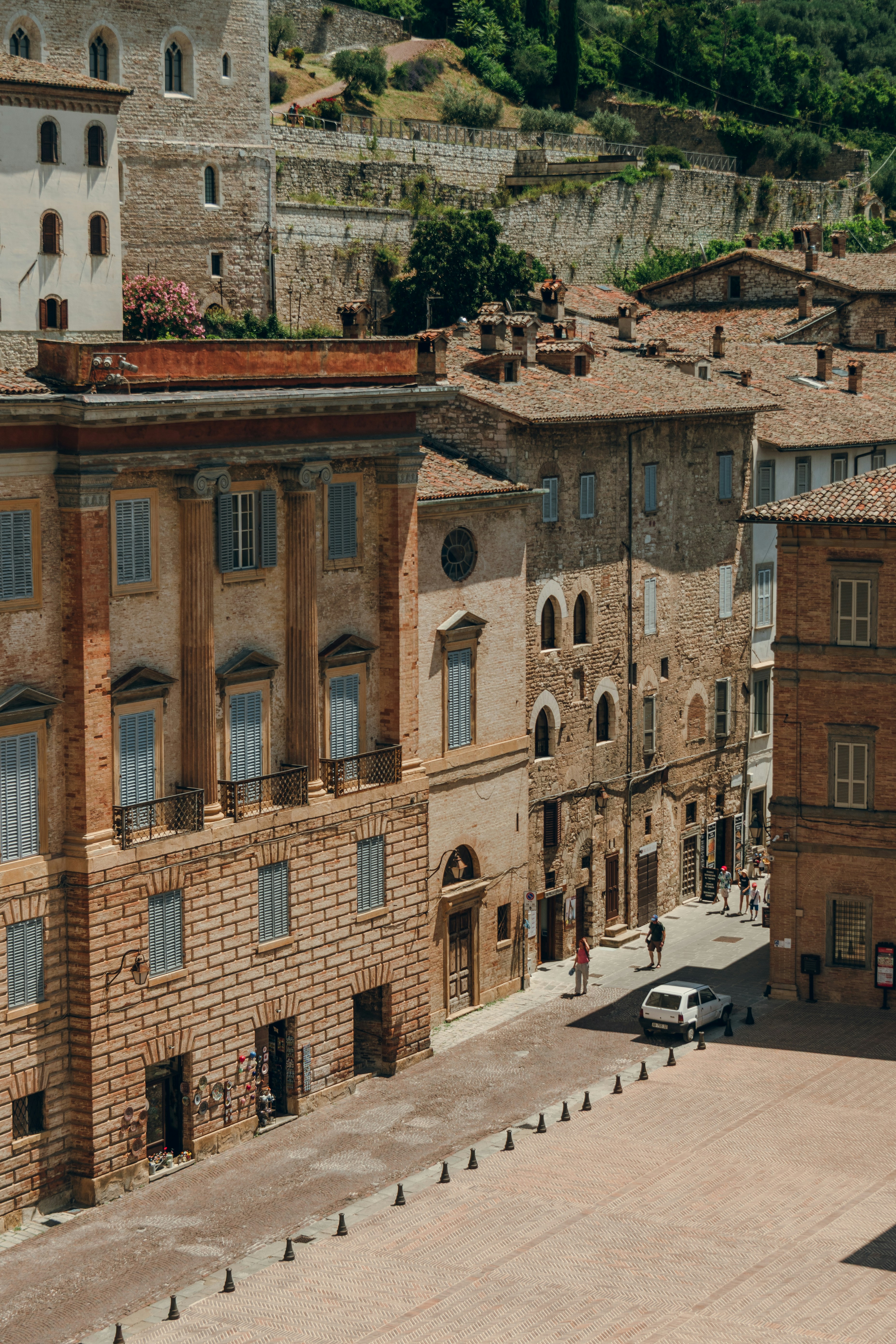 Stone Facades and Twilight Alleyway: A Sunlit European Street