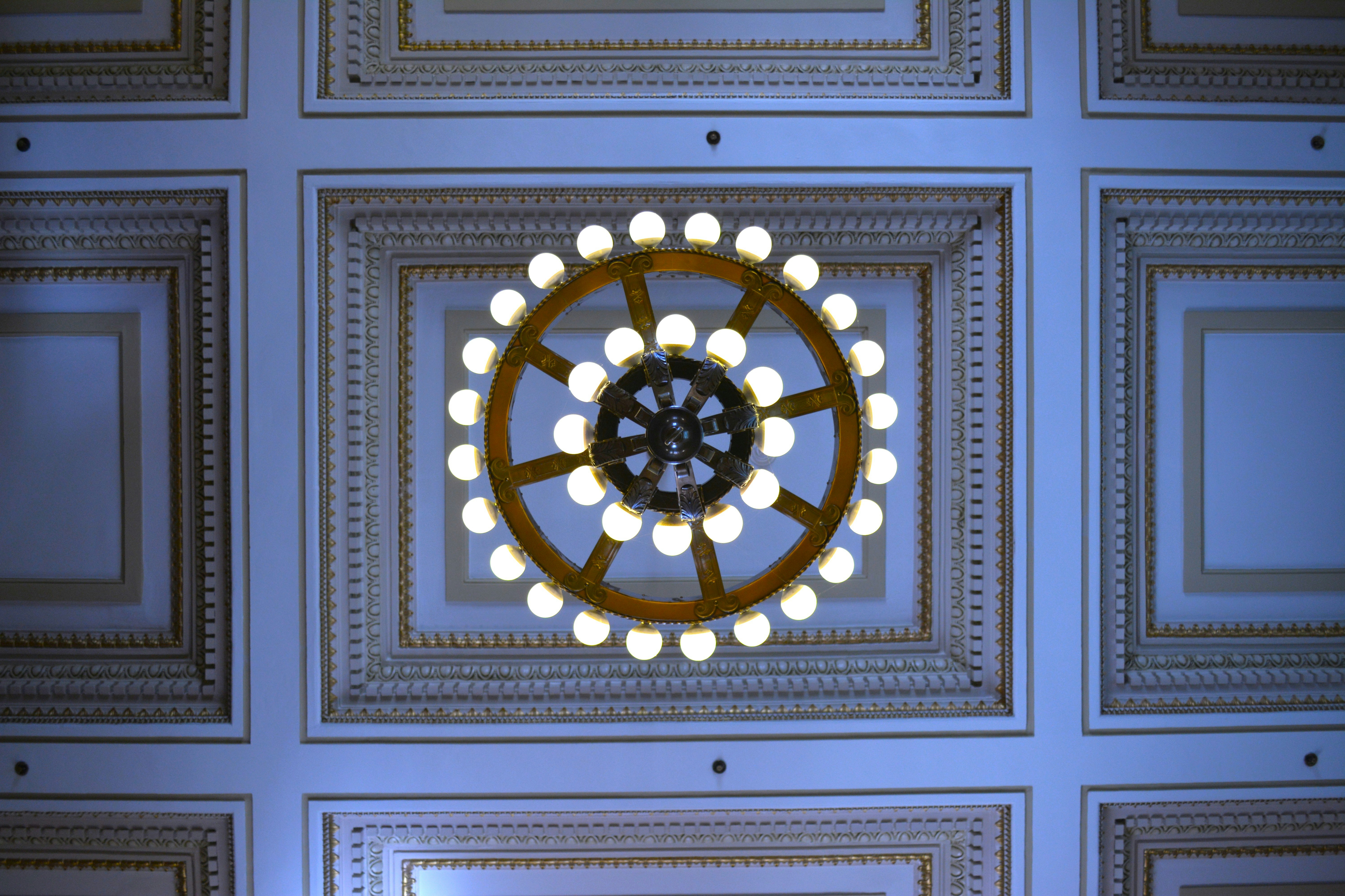 Ornate Central Chandelier Framed by Architectural Recesses