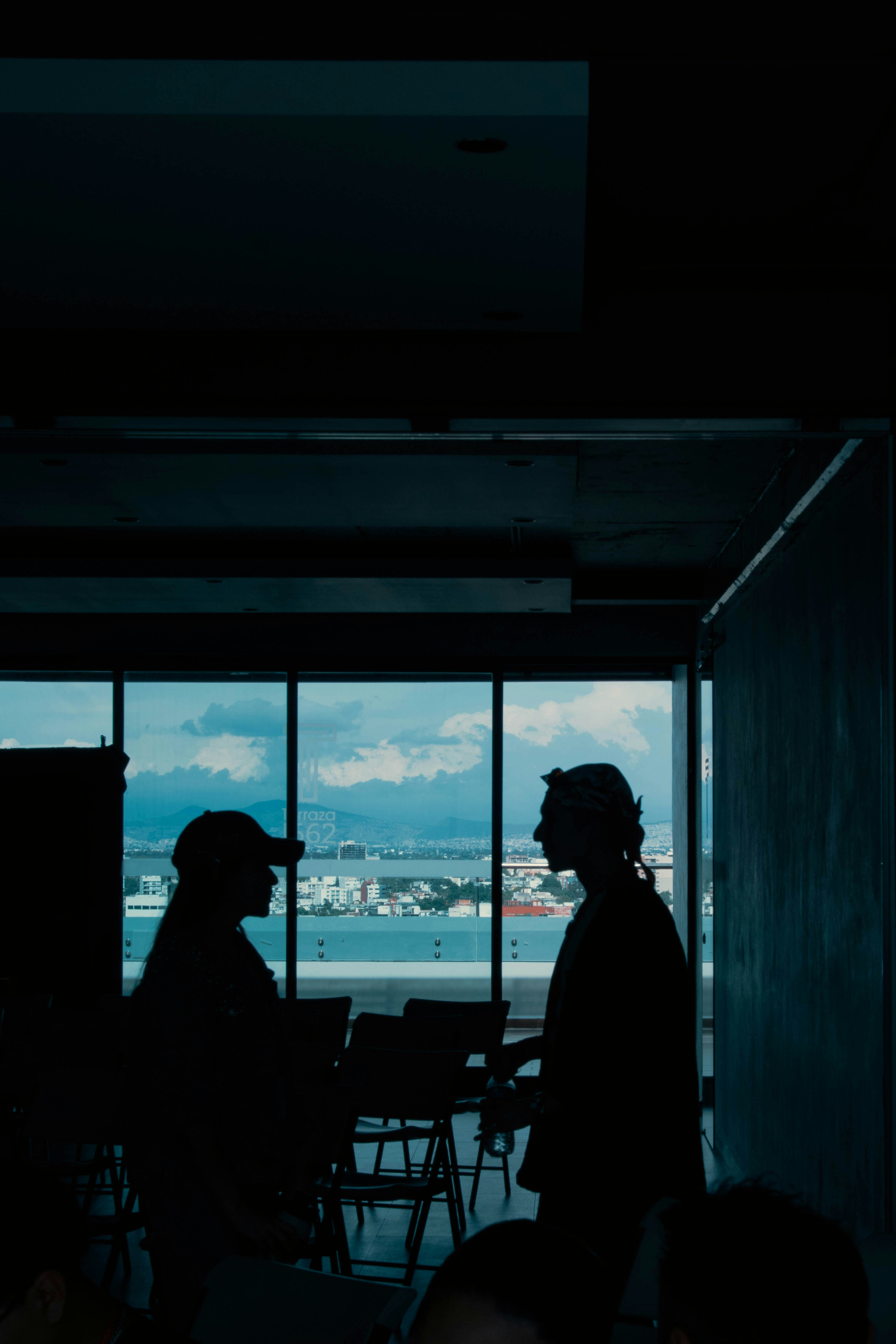 Silhouetted Conversation in a Bright Horizon Studio