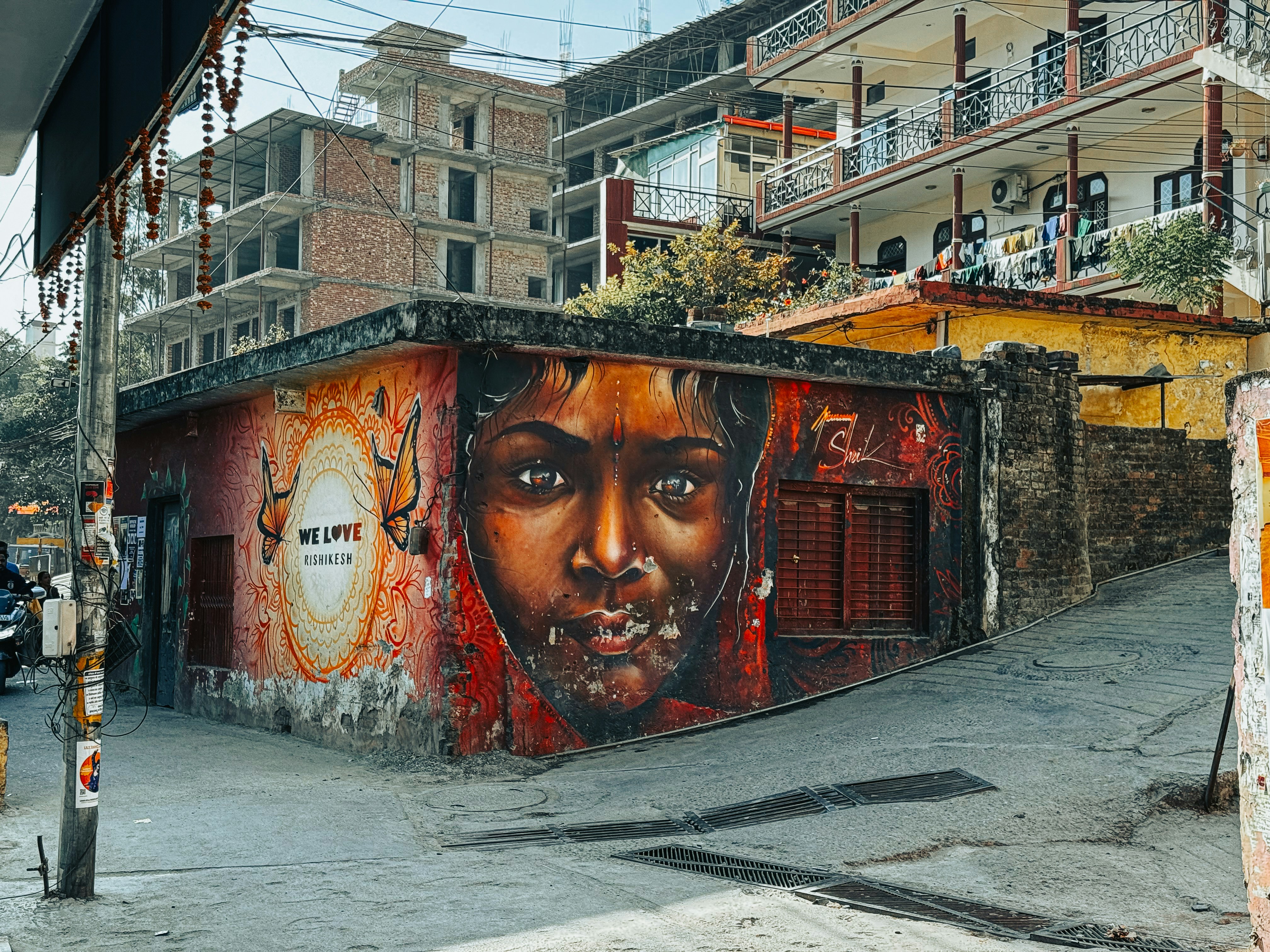 Face of the Street Mural: A Portrait Surrounded by Concrete Ways