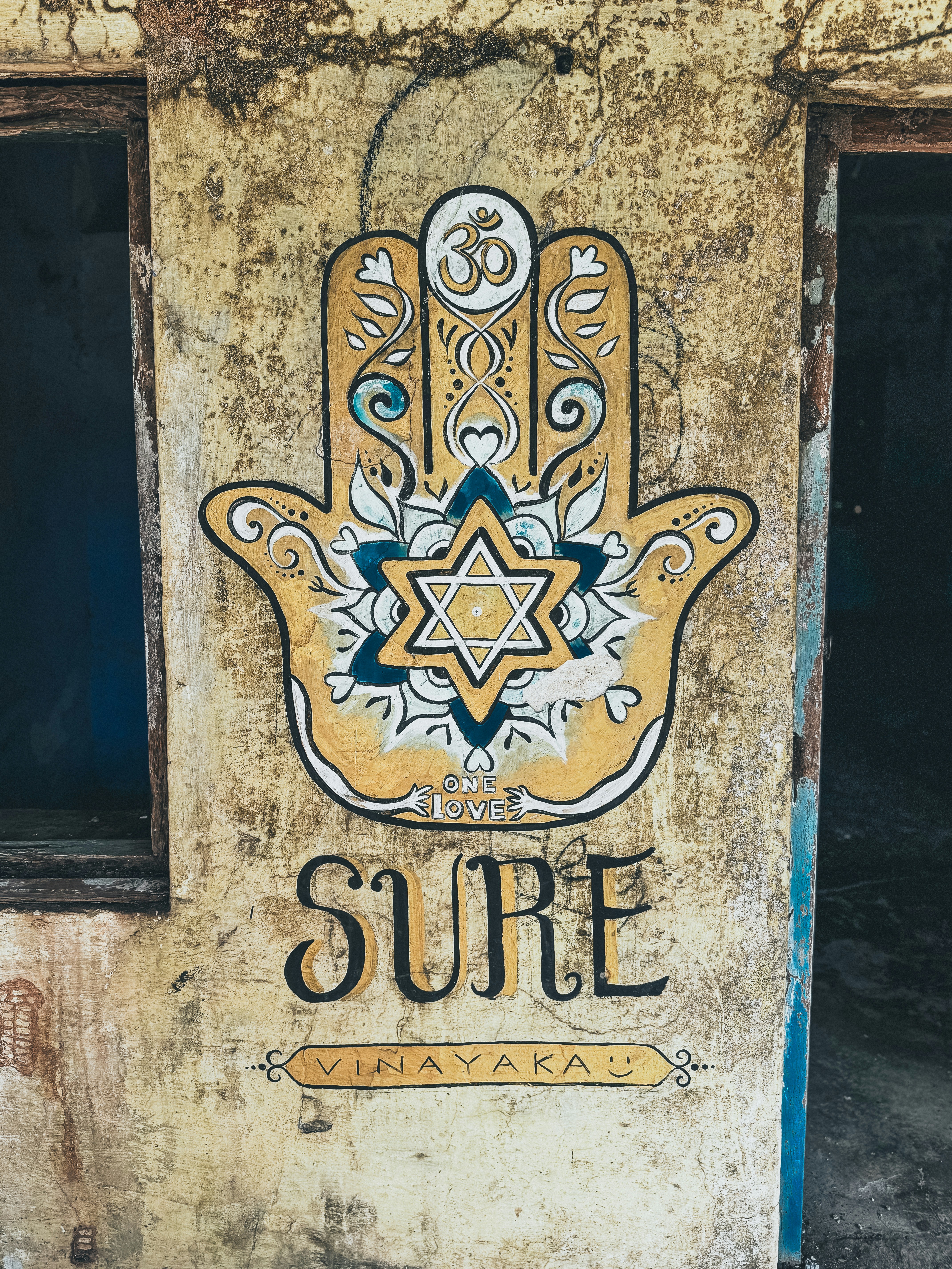 Hamsa of Unity: Star of David framed by a weathered wall centerpiece