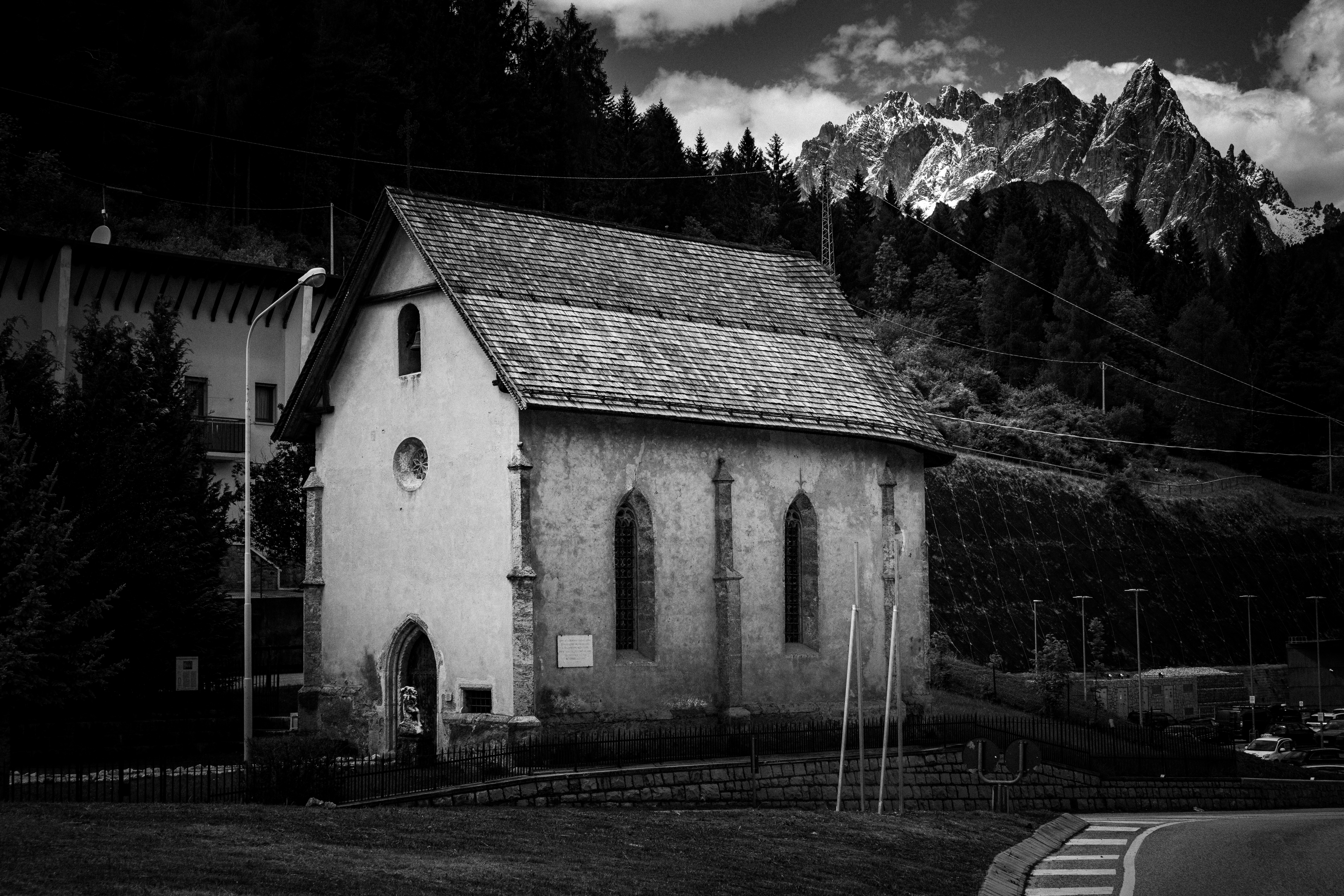 Whispering Chapel: A Quiet Granite Farmstead Barges Against Alpine Peaks
