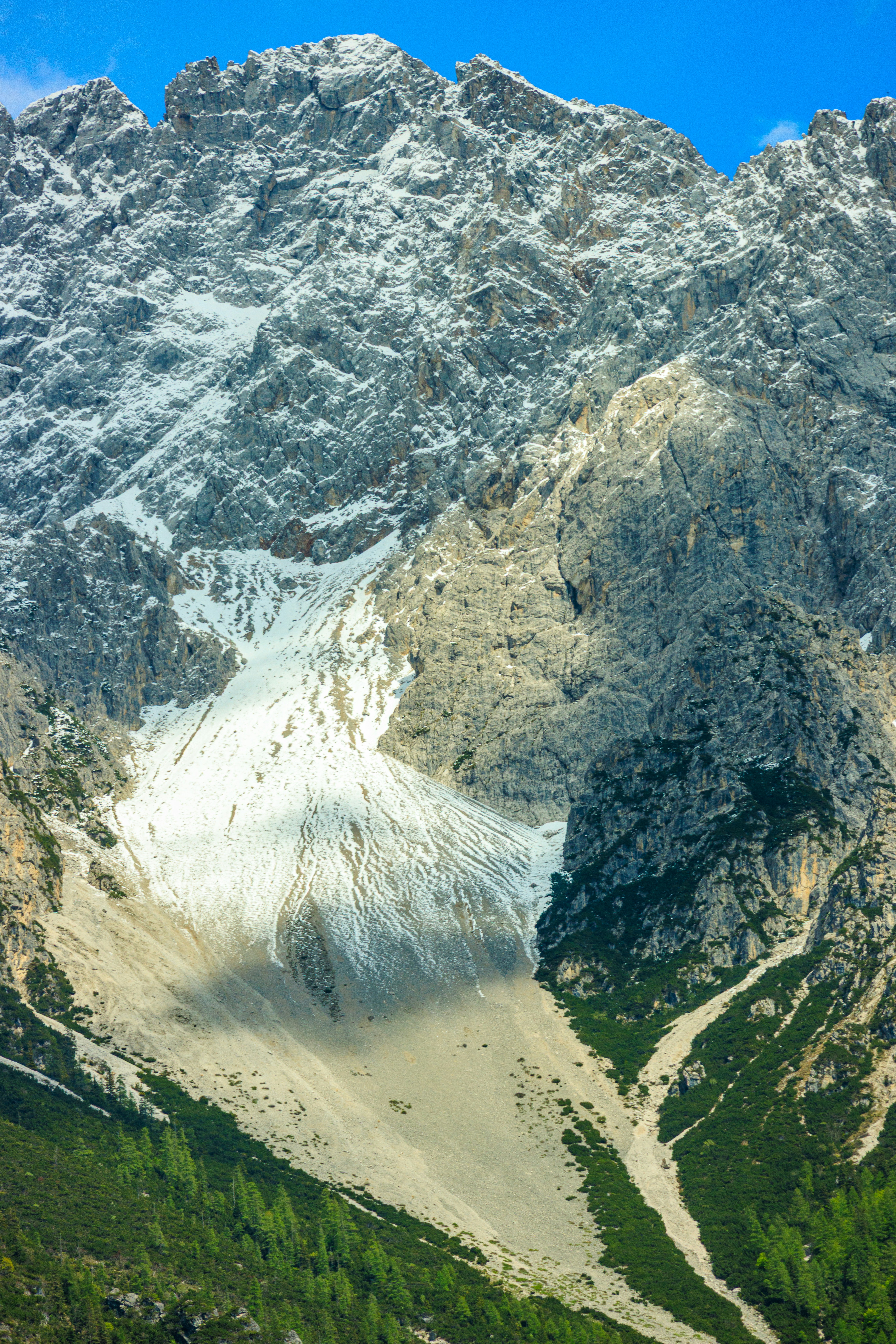 Snow-Capped Ridge Under a Clear Alpine Sky