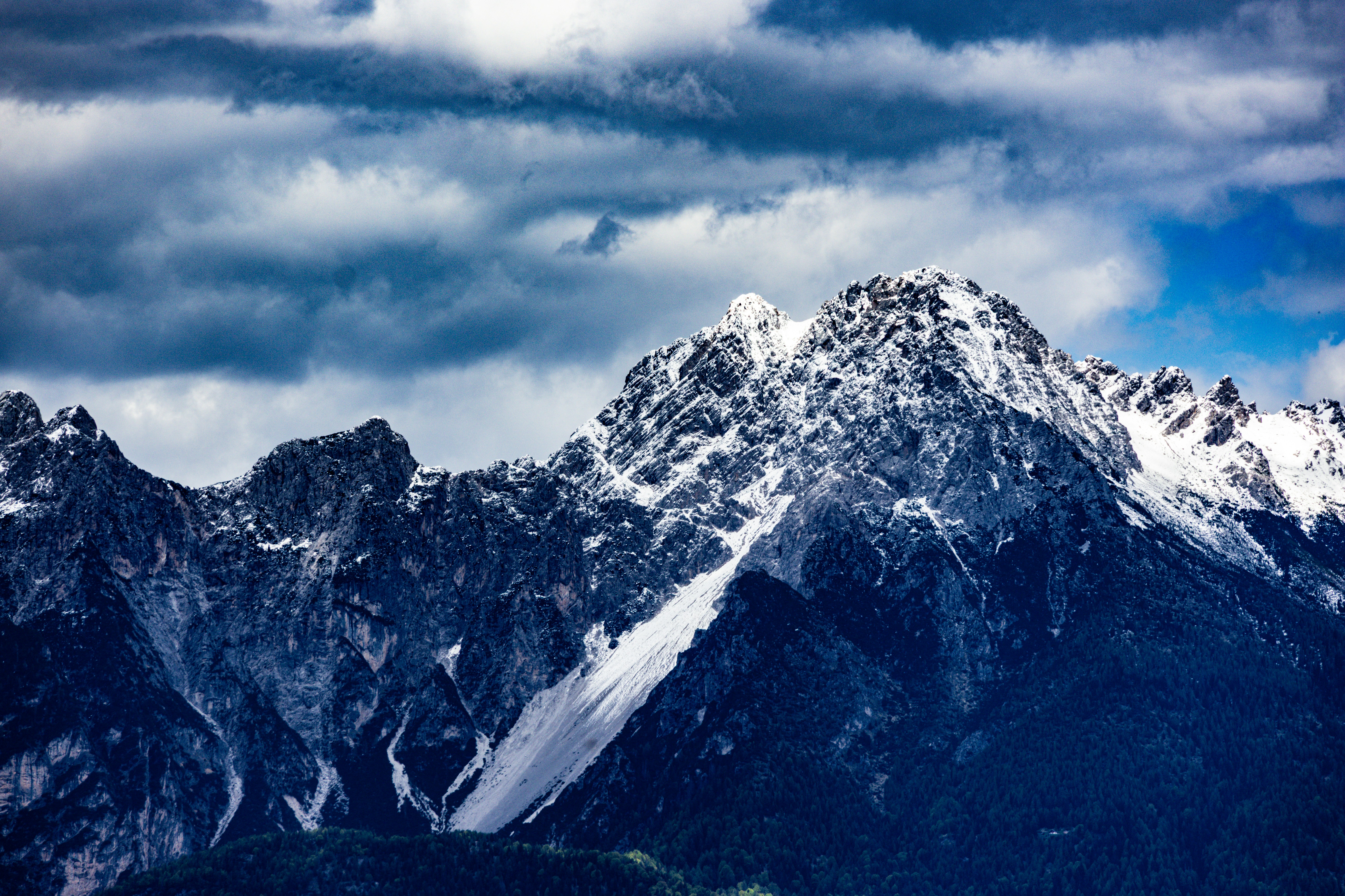 Snow-Crowned Peak Under a Painted Sky