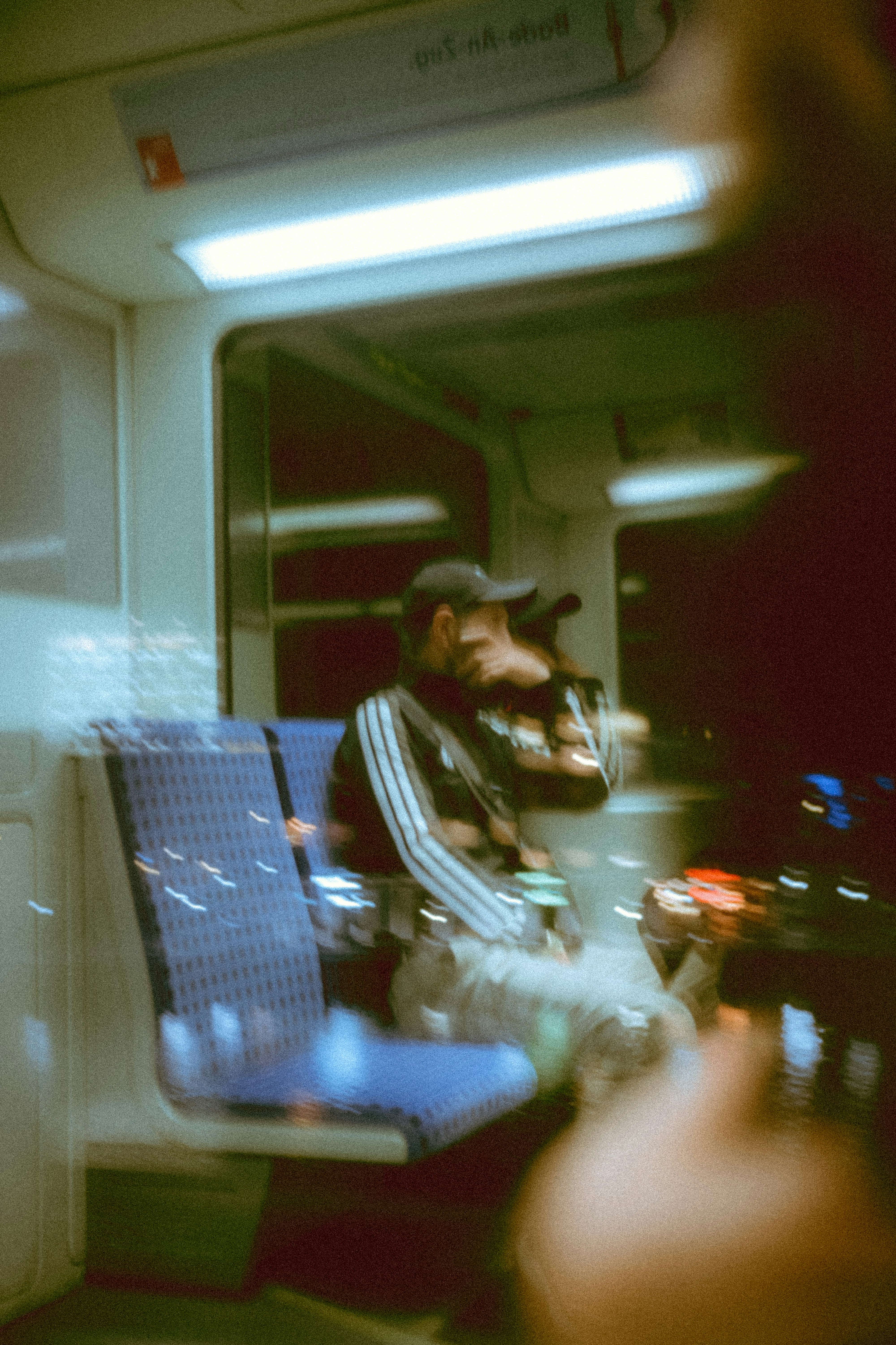 Night Bus Quiet: A Dim Ride with a Masked Stranger