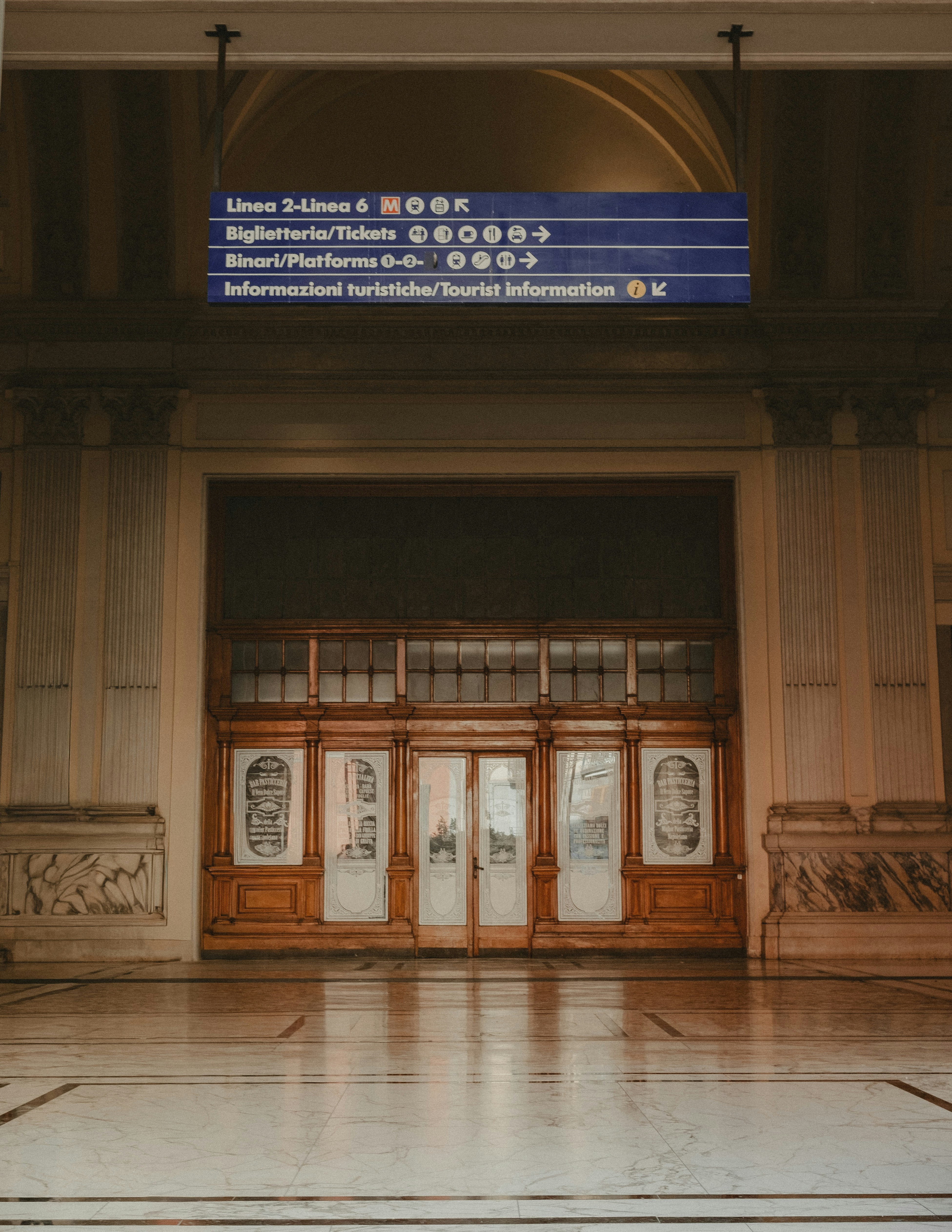 Closed Doors, Quiet Hall: A Dusk in the Station Atrium