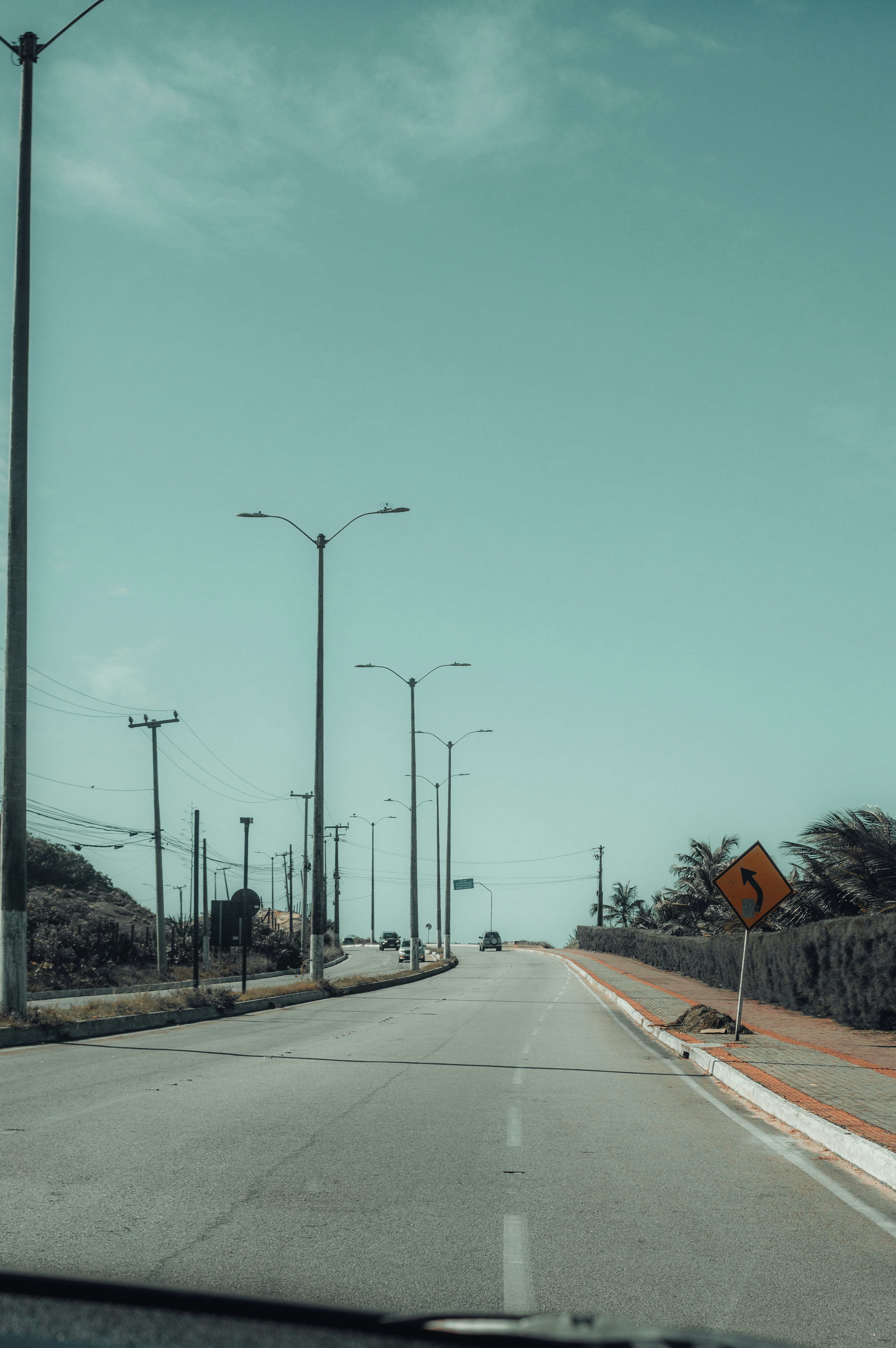 Coastal Highway Leads the Eye toward the Distant Intersection