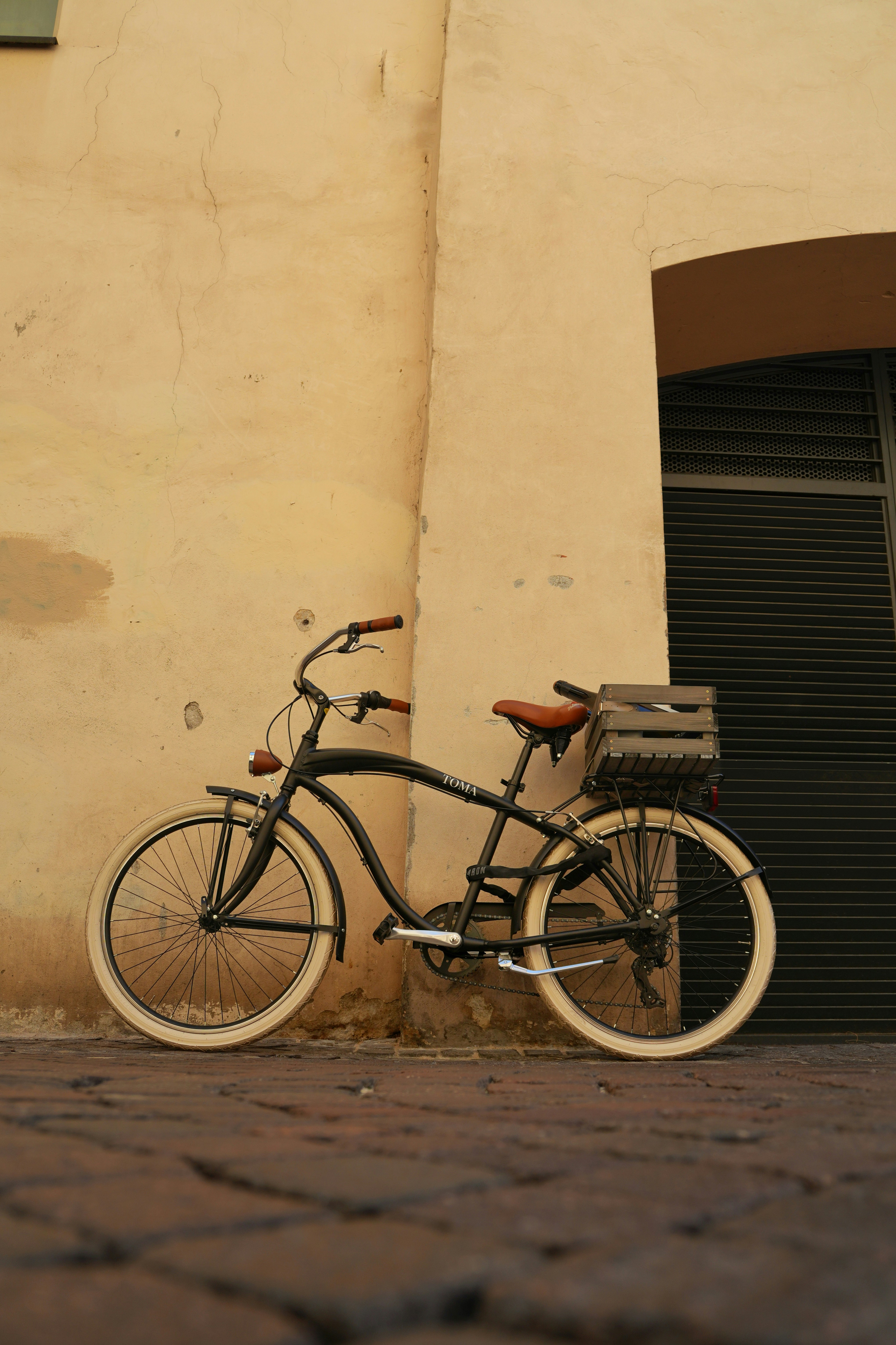 Urban Bicycle Against a Weathered Wall