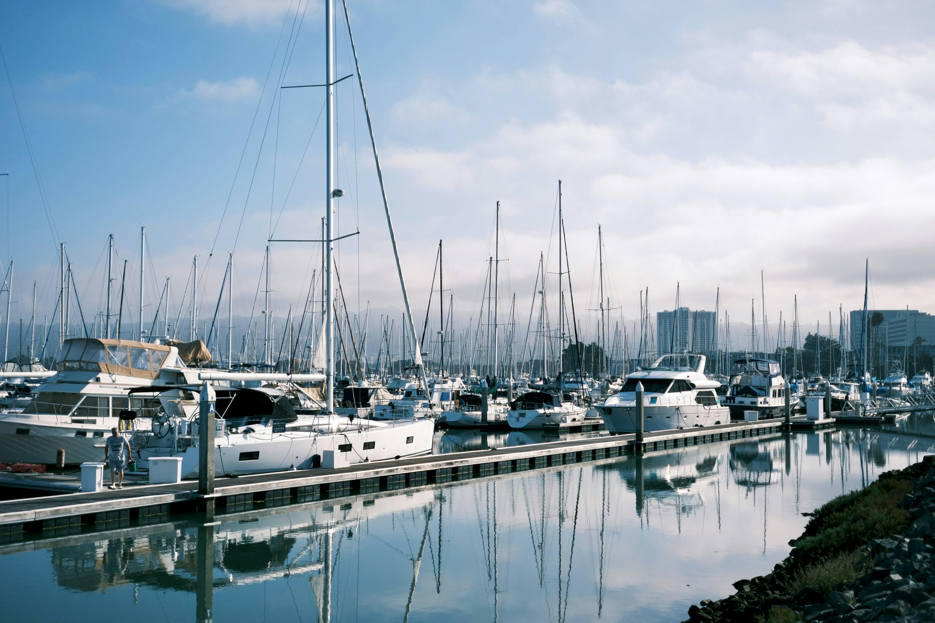Silent Fleet at Dusk: Reflections in a Serene Marina