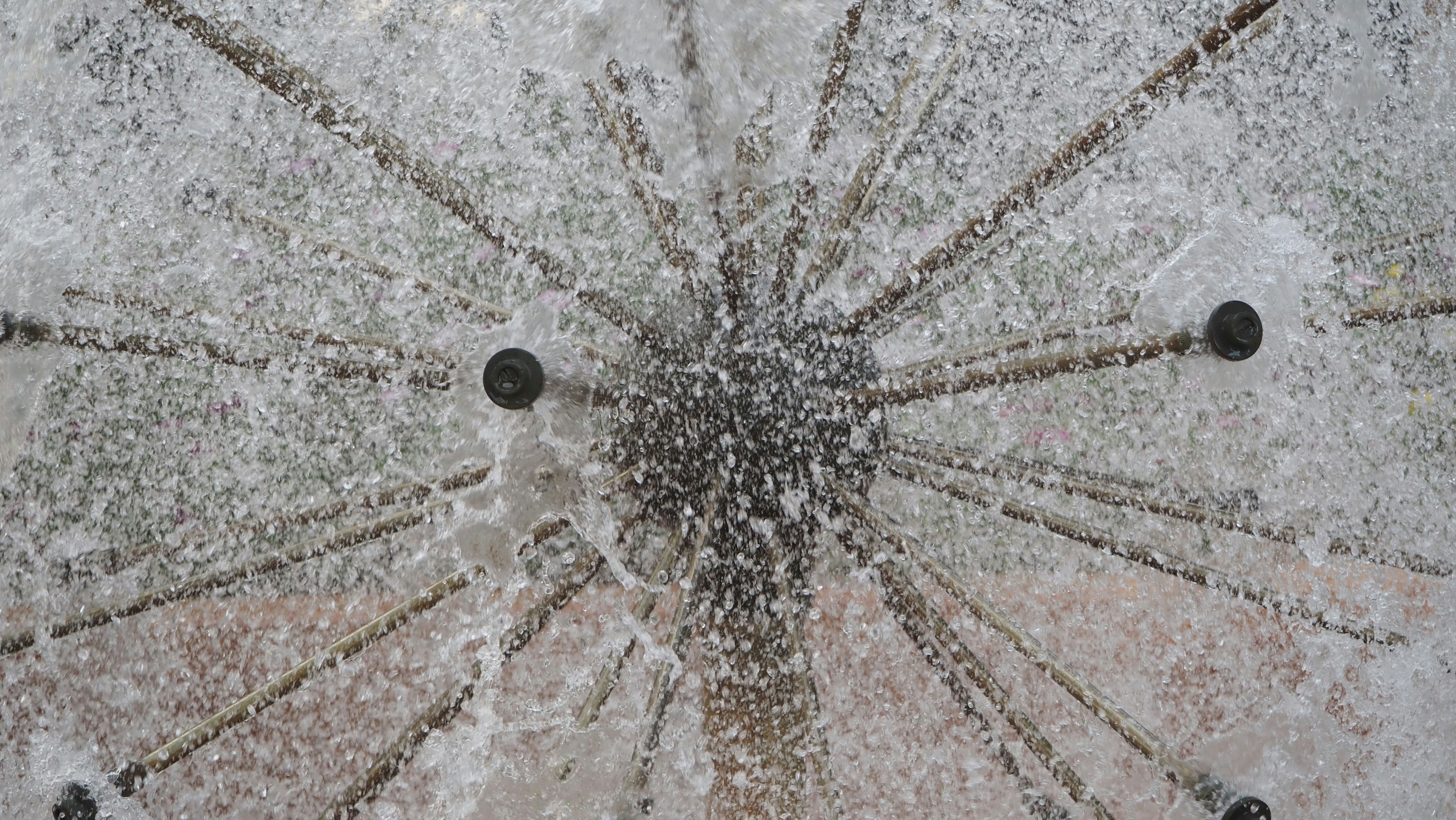 Radial Snowburst: Snow-Dusted Spokes and Central Hub
