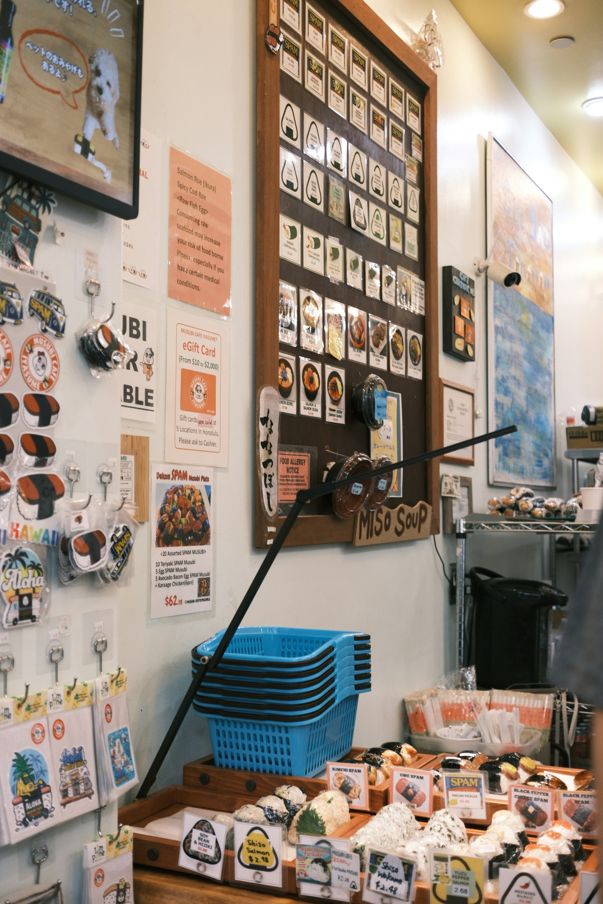 Sushi Stand in a Cozy Market Eatery Adorned with Menu Boards and Artwork