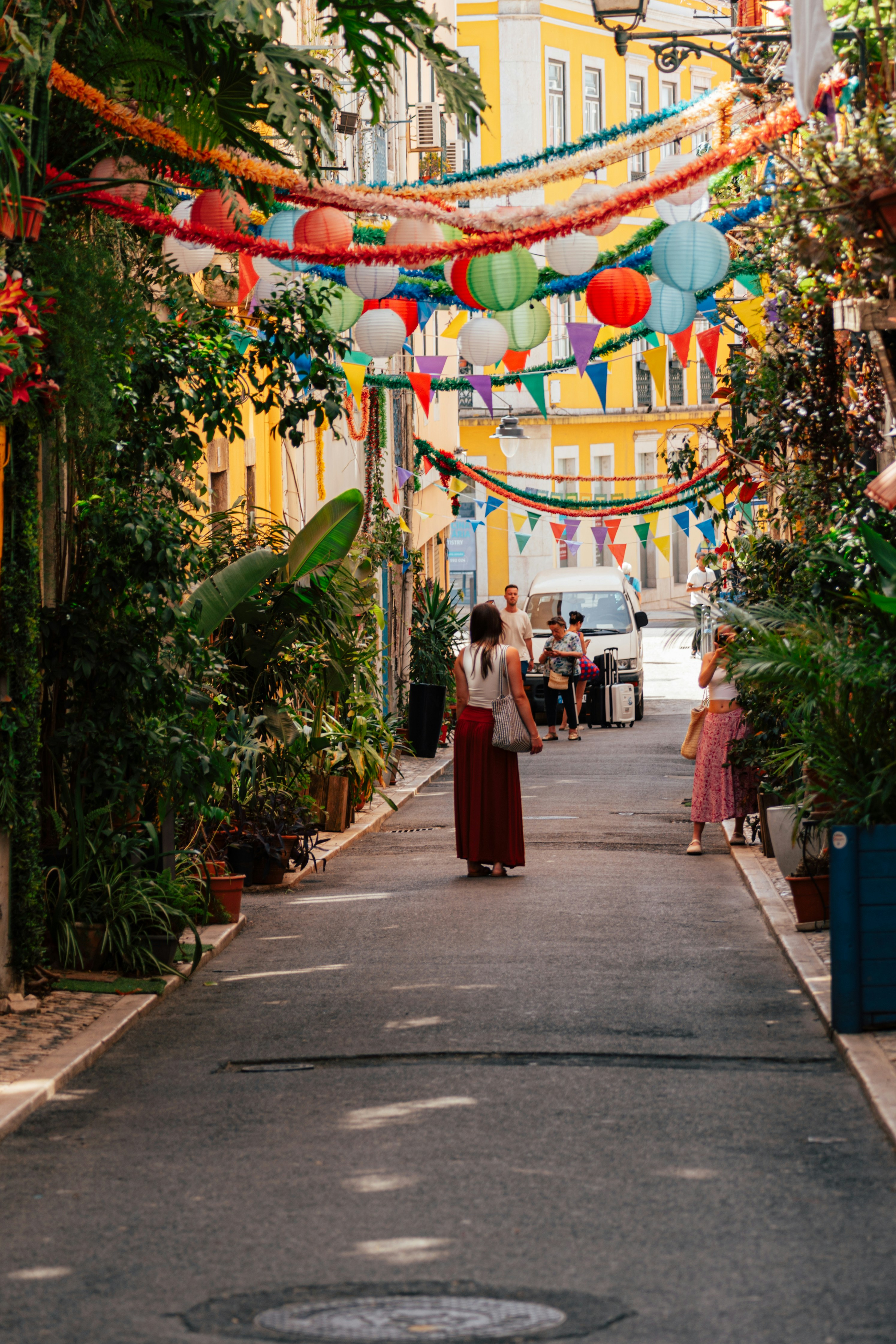 Colorful Street Festival Under Hanging Lanterns