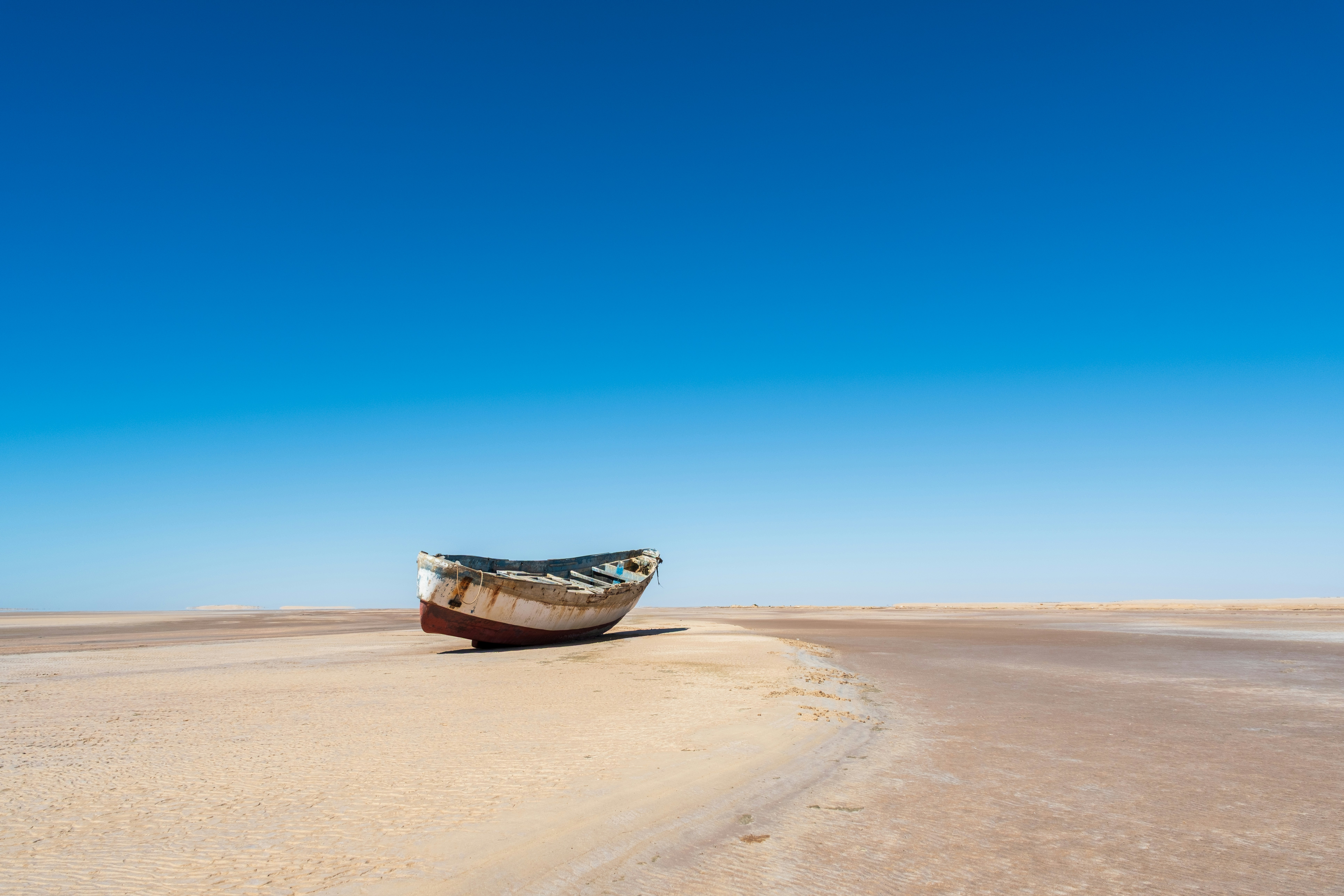 Lonely Boat Resting on a Deserted Shore