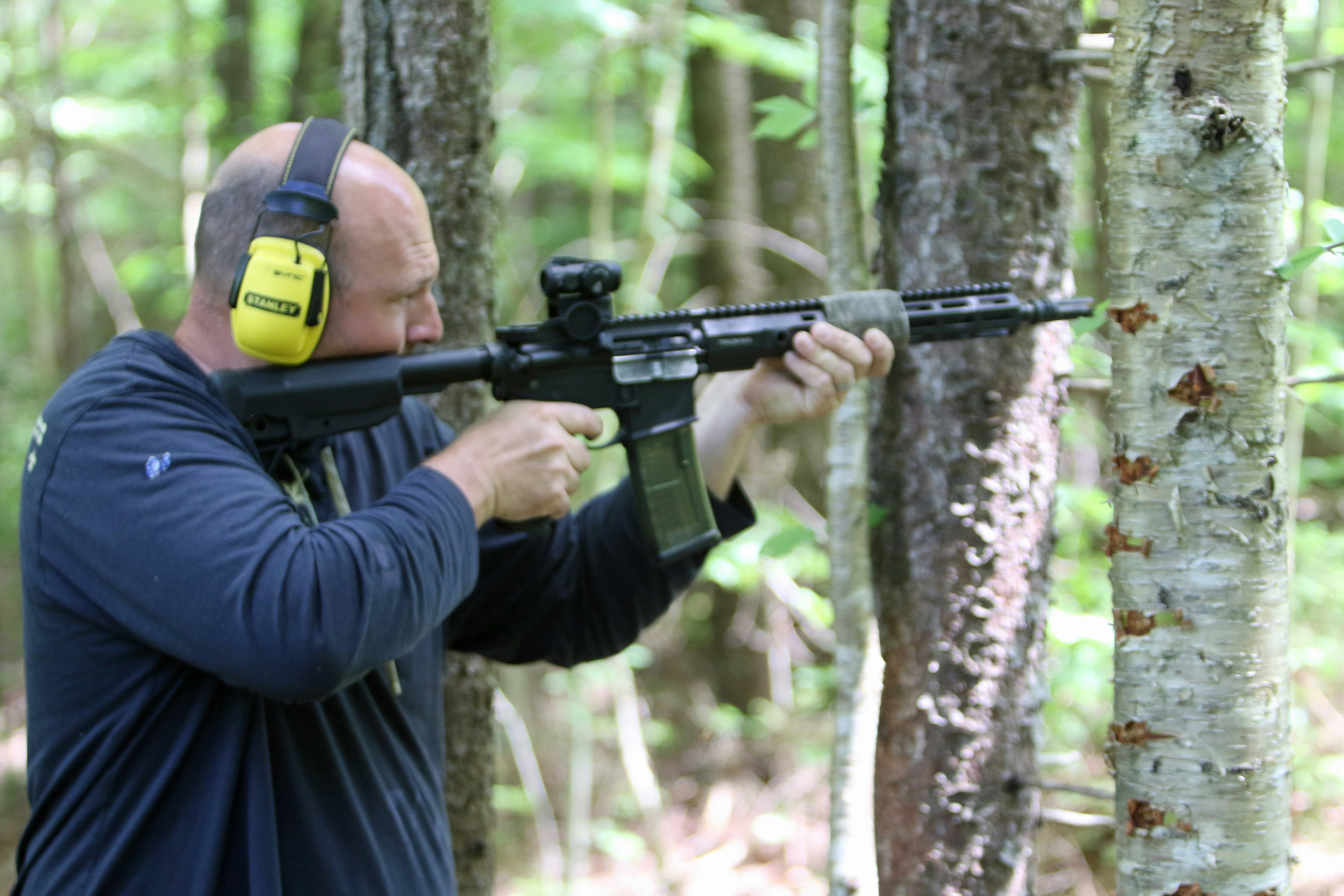 Precision in the Pines: A Marksman Calibrates Focus