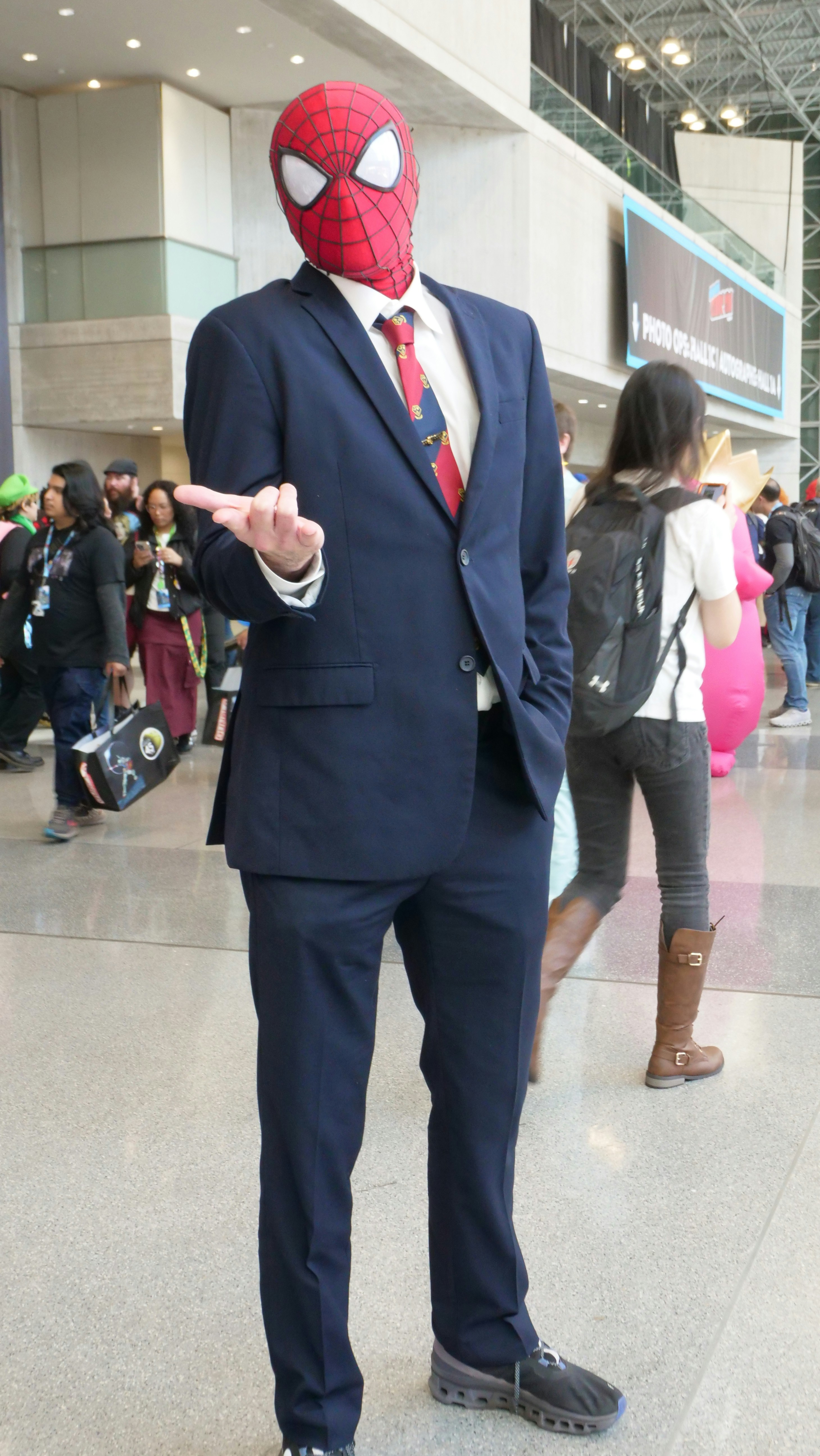 Spider-Suit in the Atrium: A Confident Pose at a Convention