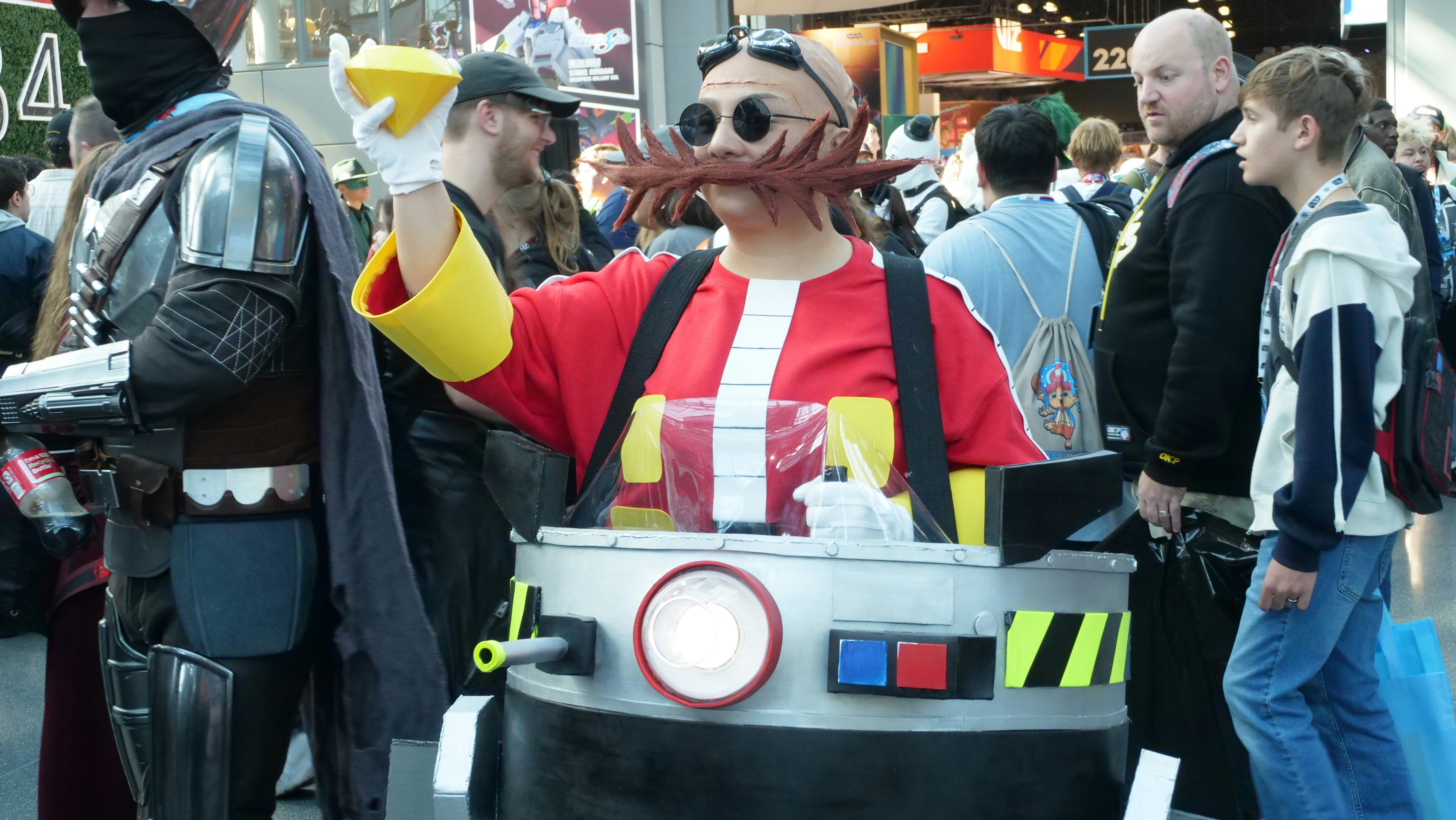 Cosplay Hero in a Foam-Driven Armored Tank Parade