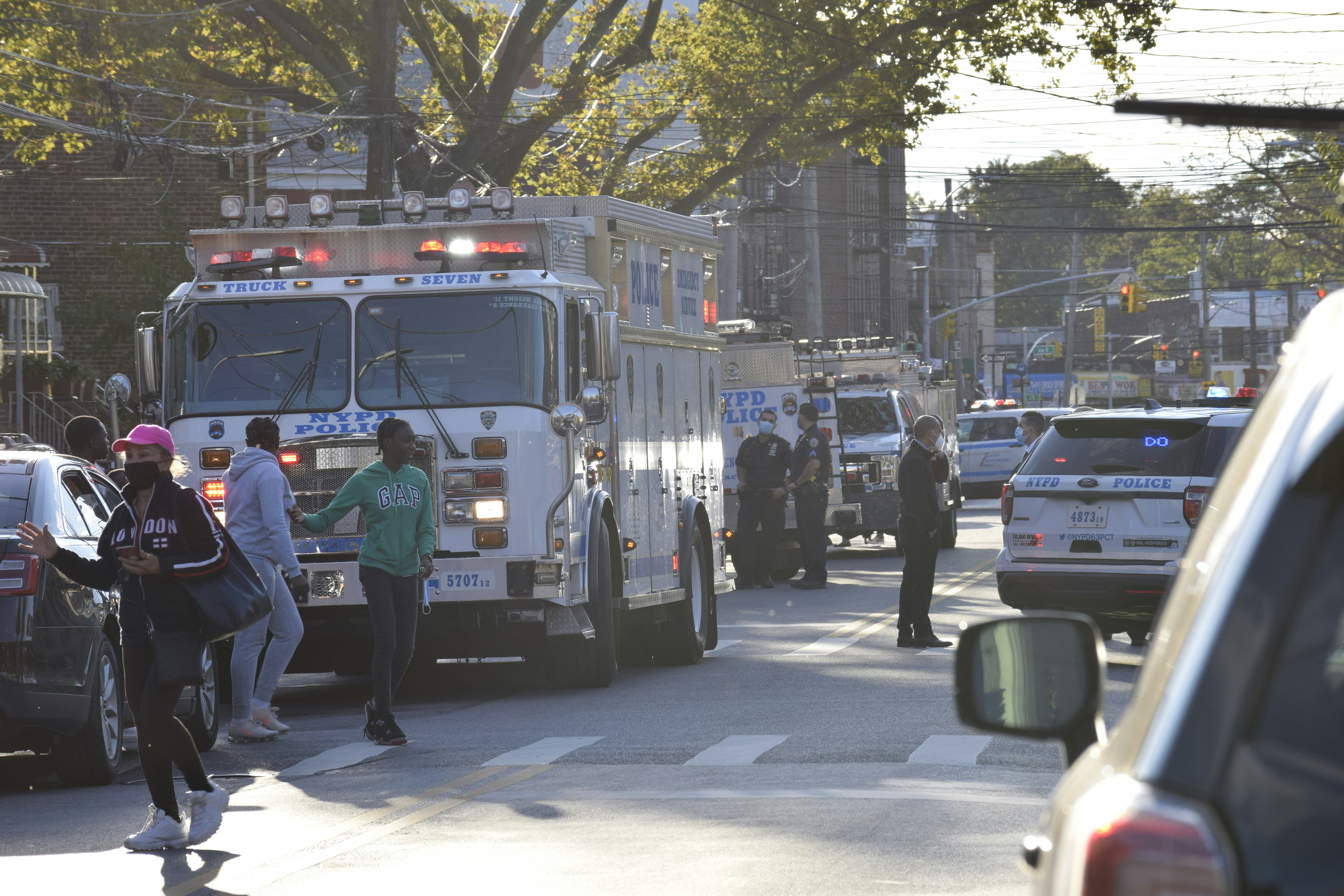 Emergency Street Scene: Responders and Bystanders on a Busy City Block
