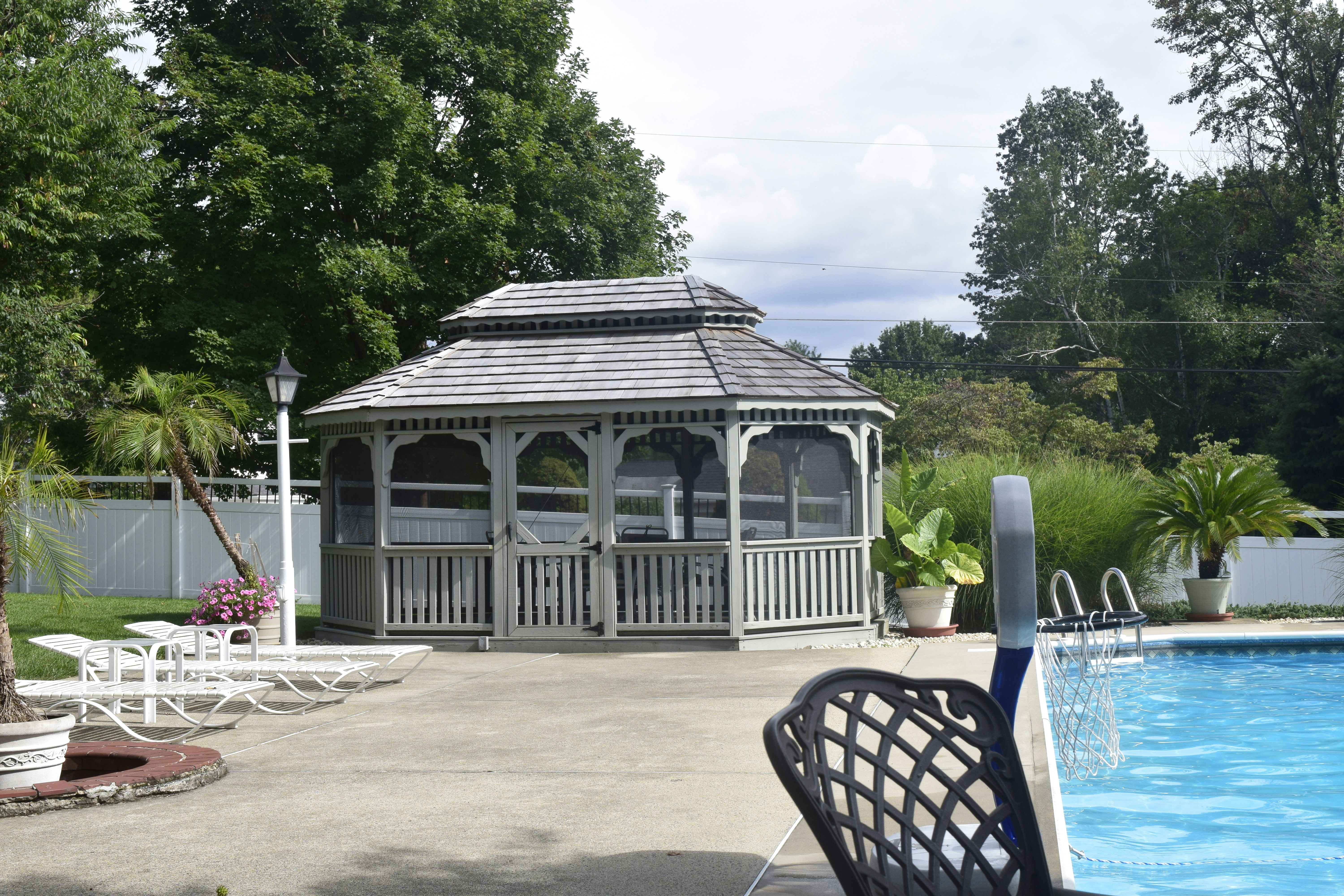 Shaded Gazebo by the Poolside Oasis