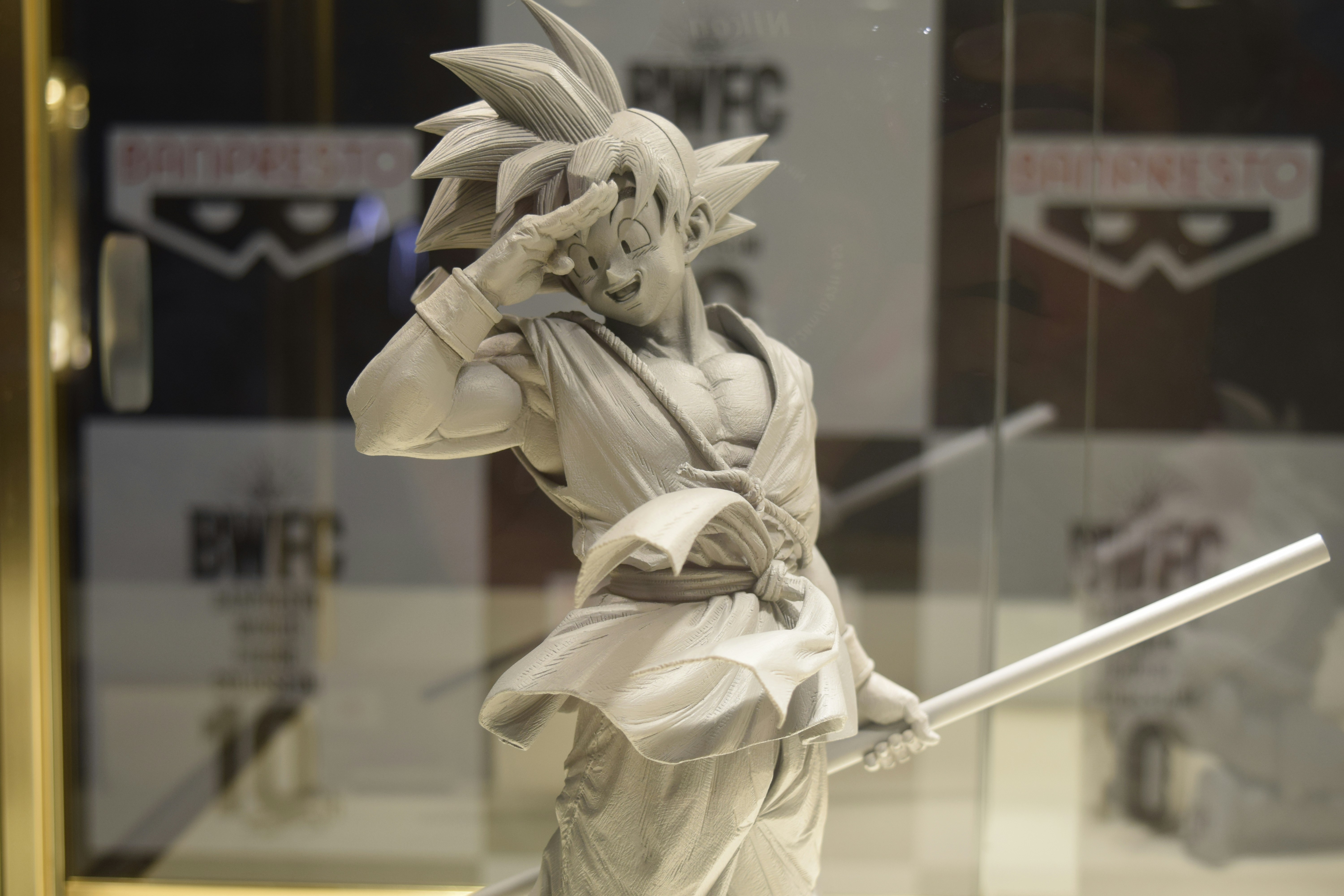 Hidden Power in Still Steel: A Neon Warrior Statue