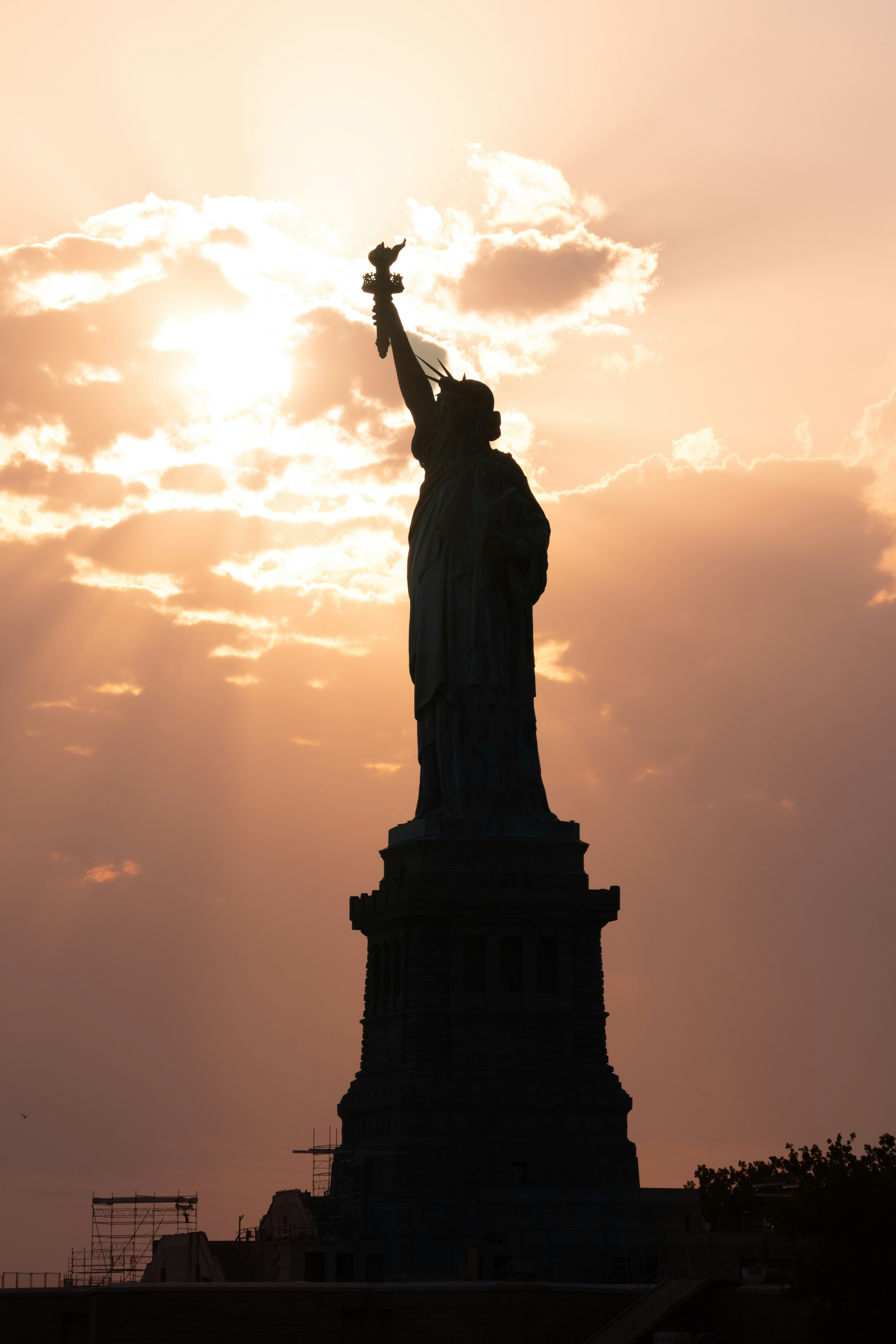 Silhouette of Liberty Rising at Sunset