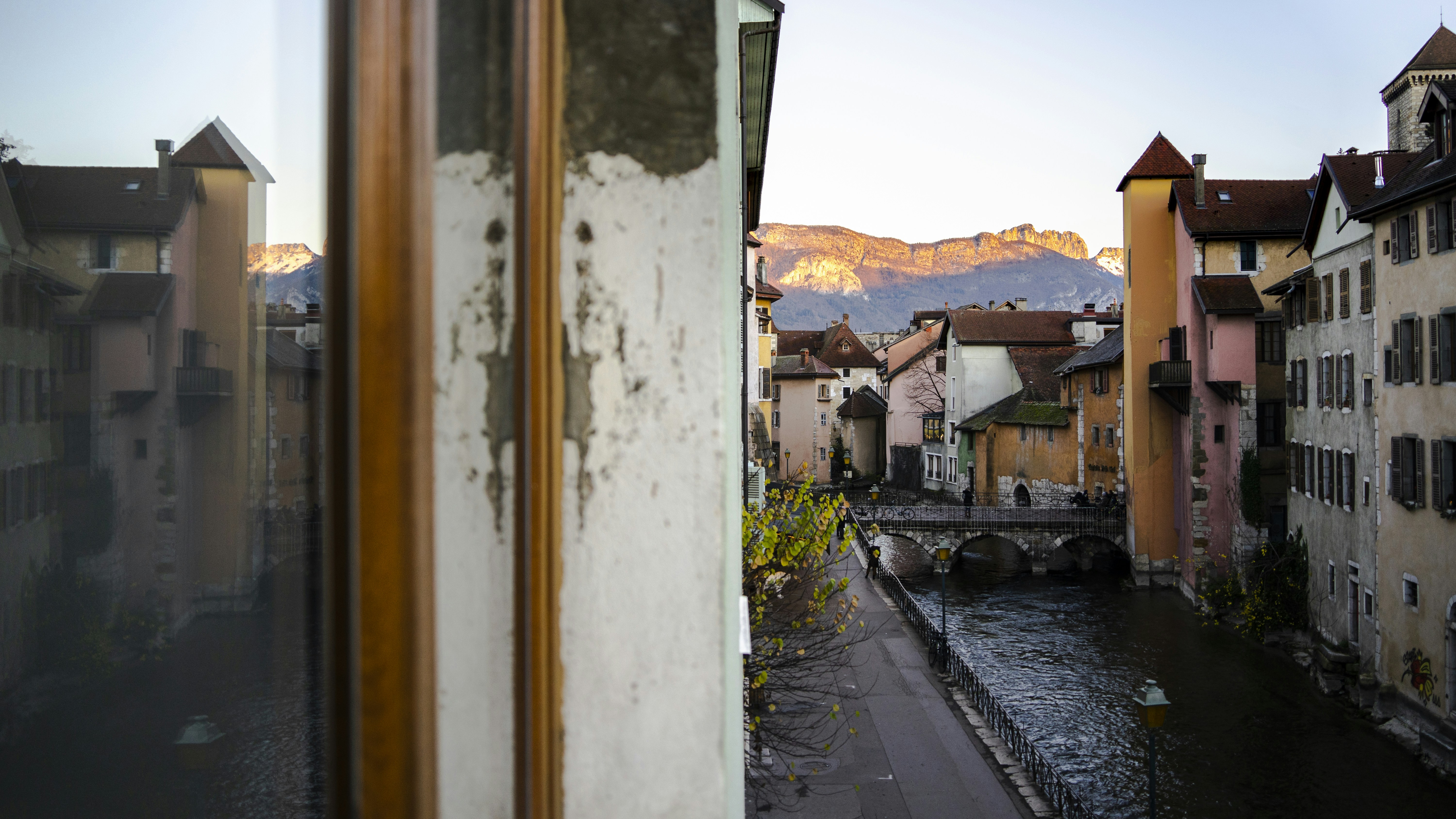 Timbered Facade Echoes Over the Venetian Canal
