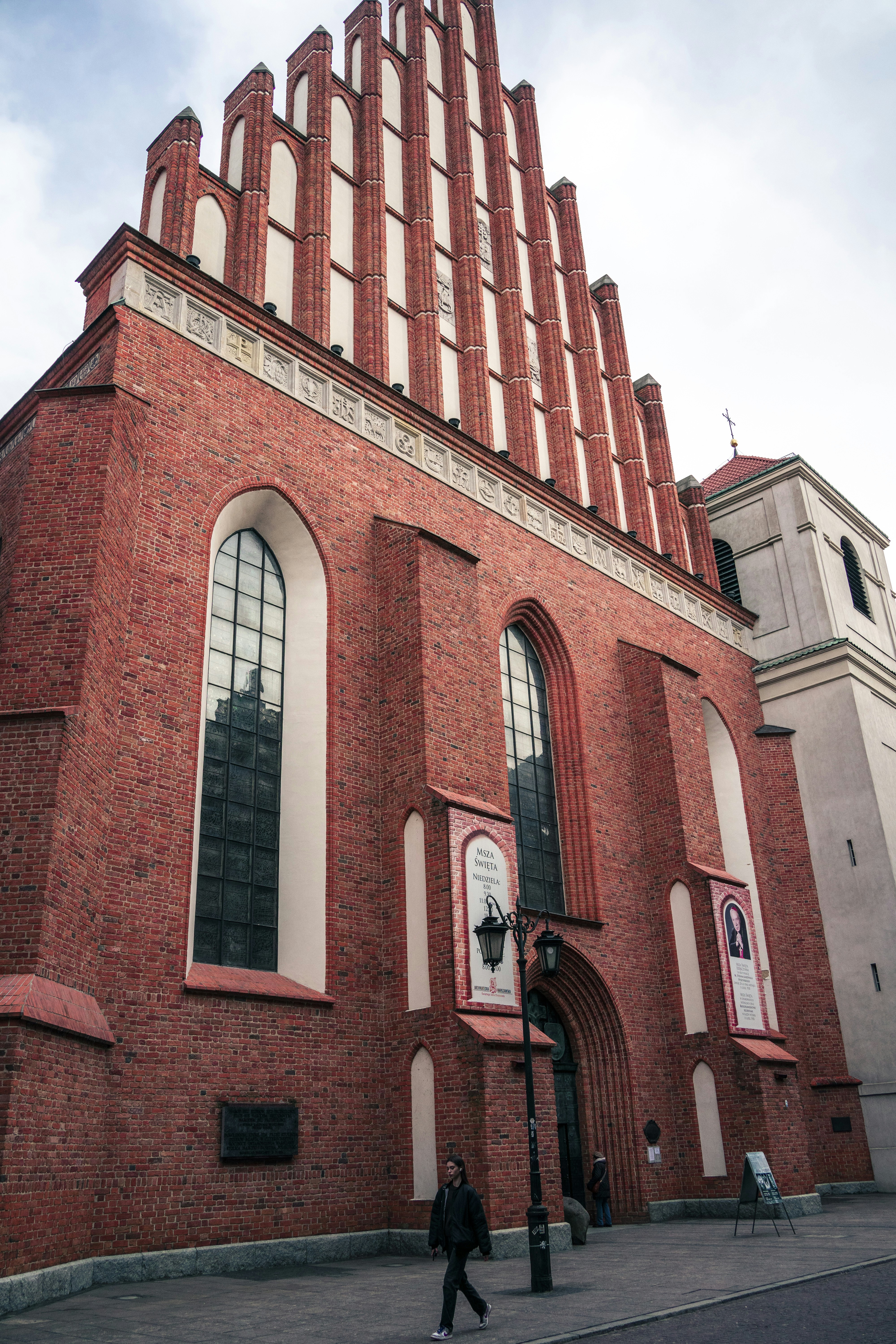 Brick Cathedral: A Torso of Red Towers Against a Clear Sky