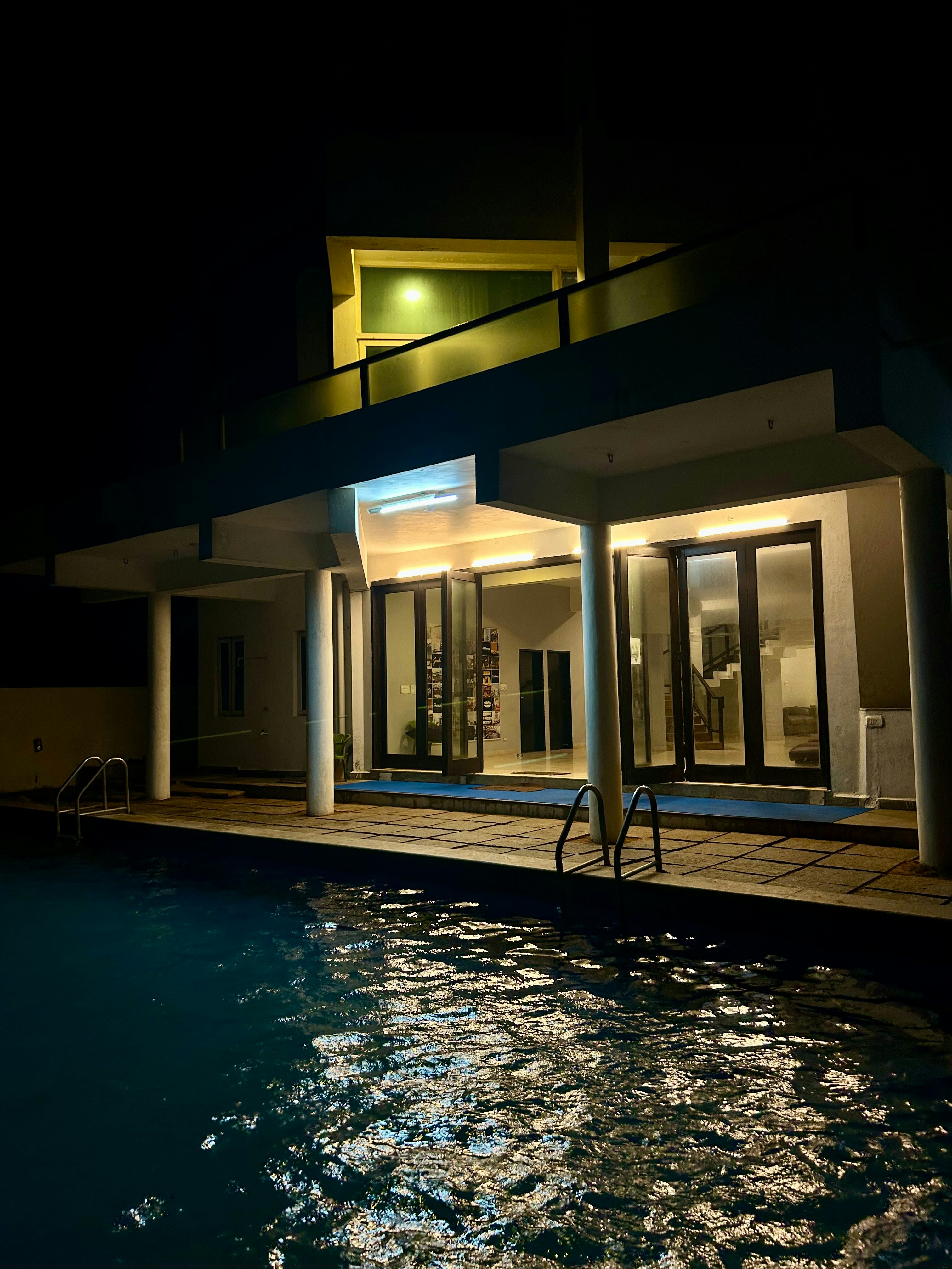 Luminous Modern Villa by the Pool at Night