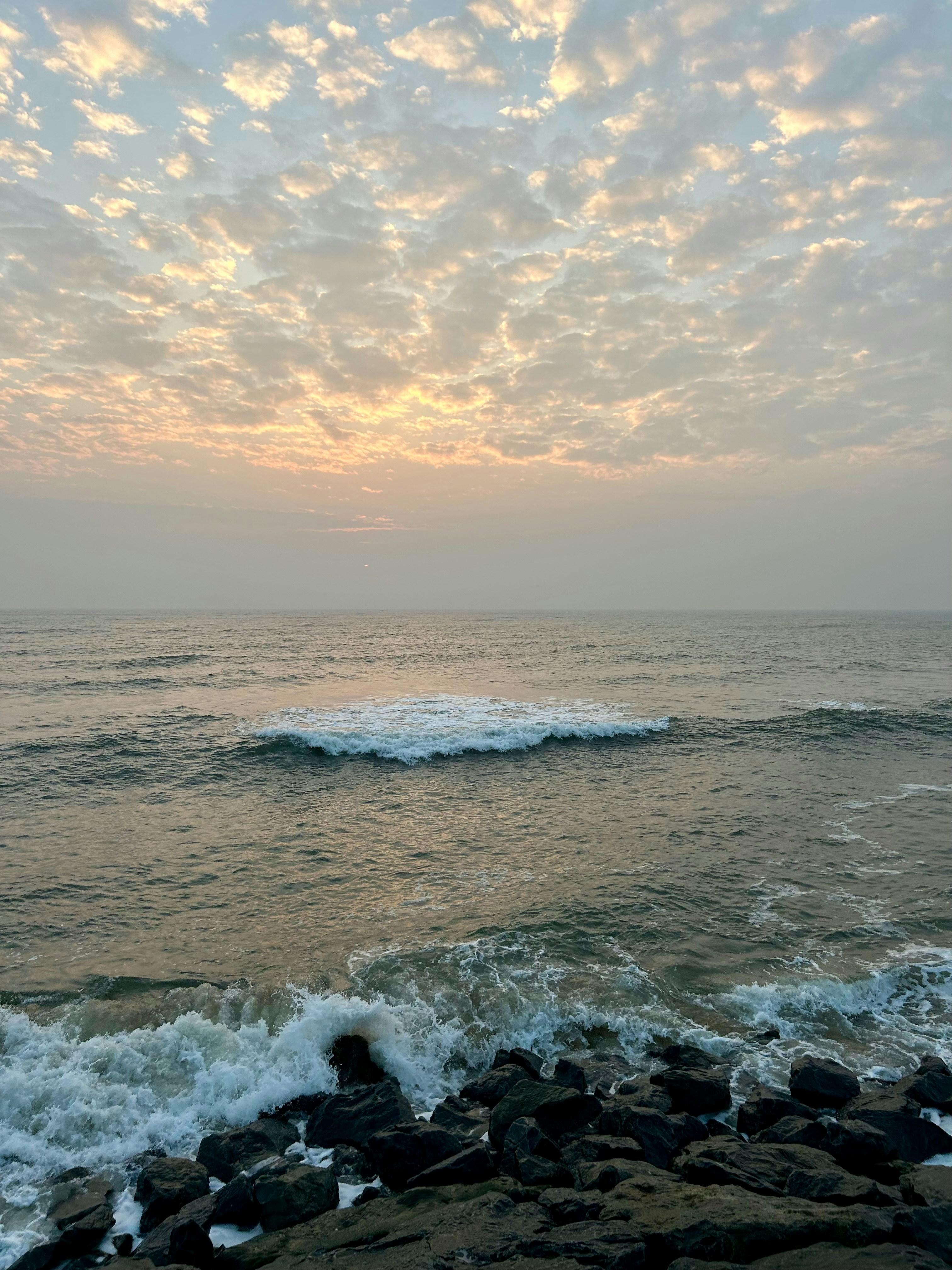 Sun-Kissed Crest: Waves Meet a Quiet Horizon
