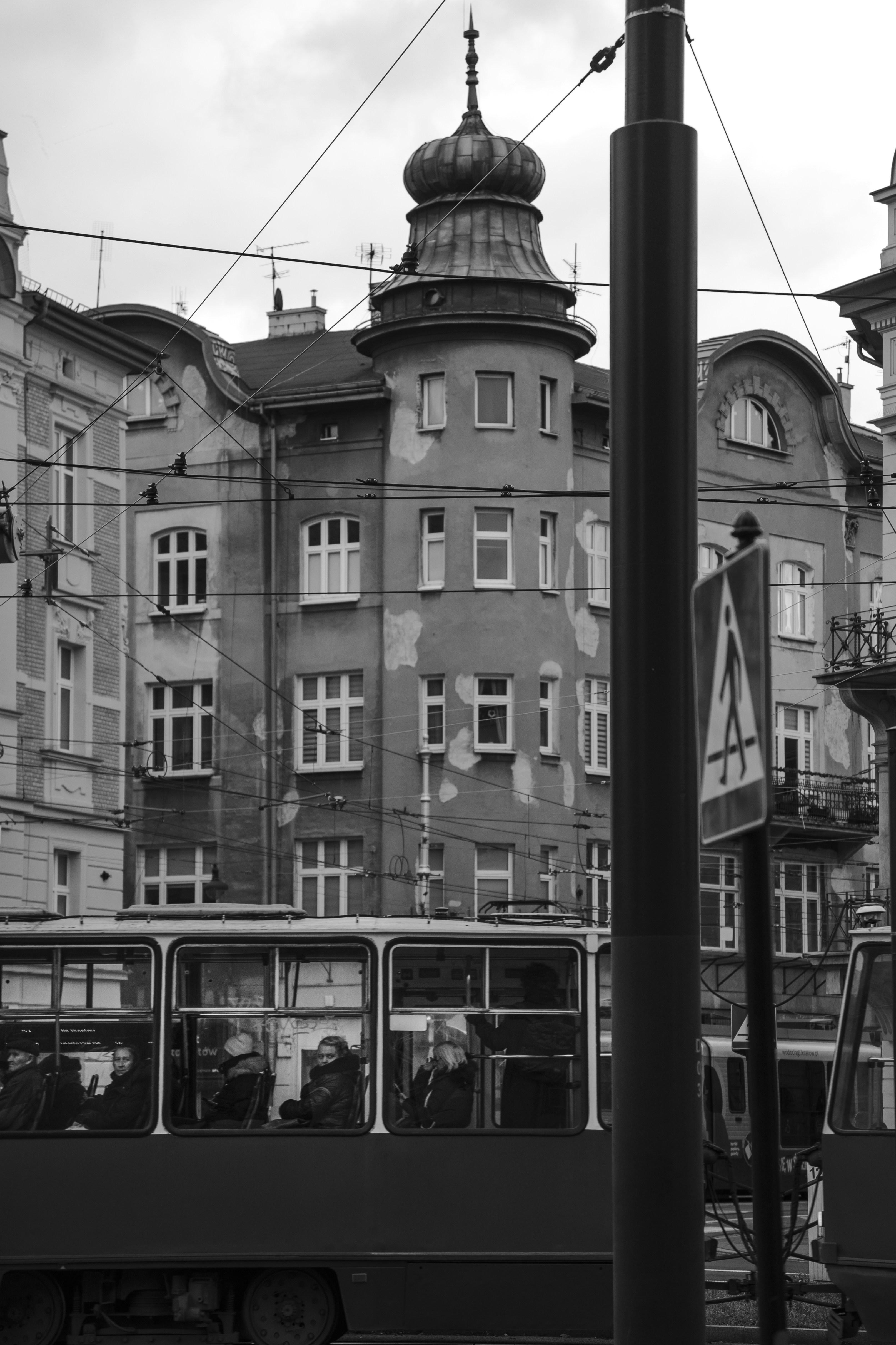  tramcar across a weathered European block