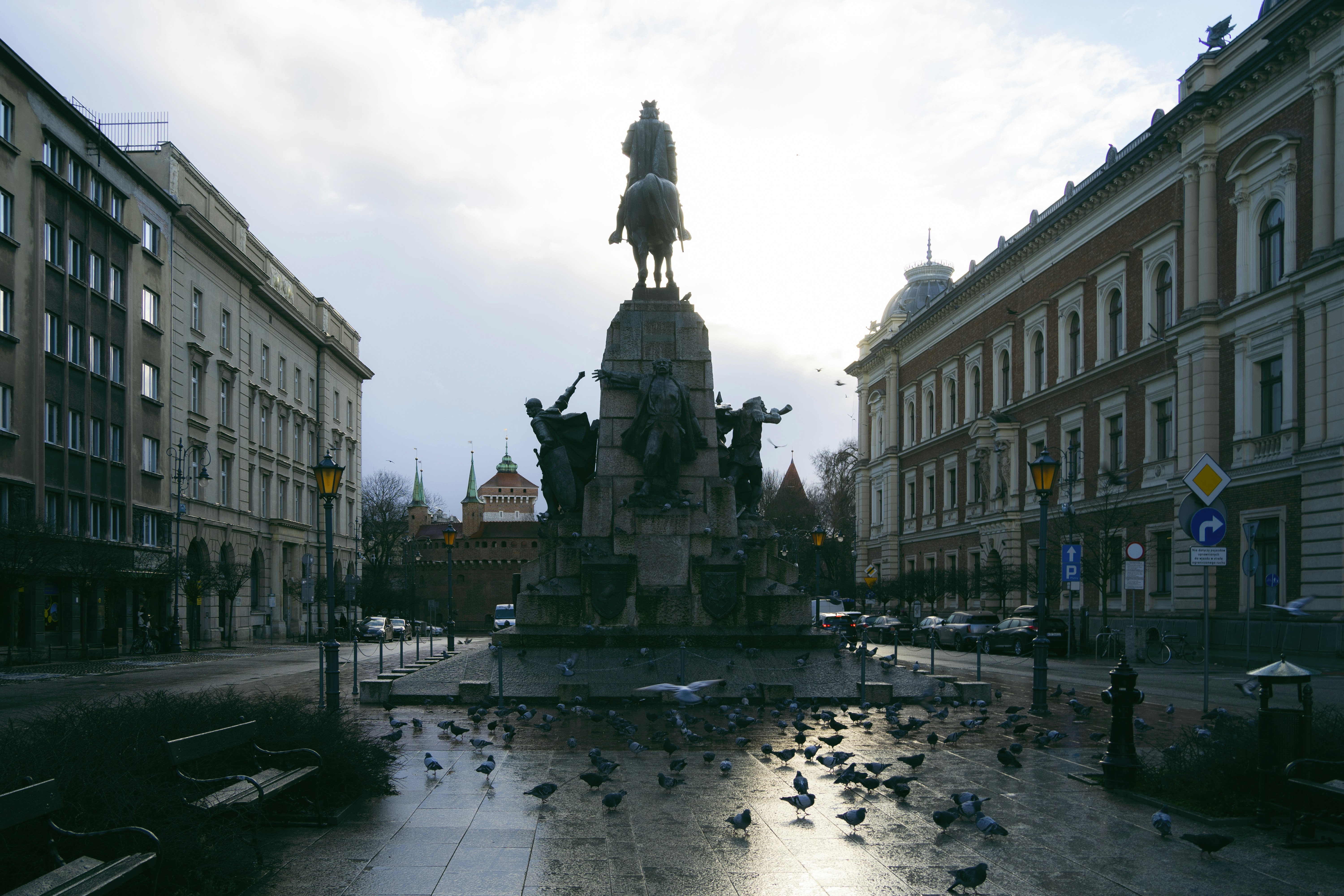 Equestrian Monument Framed by Historic Streetscape at Dusk
