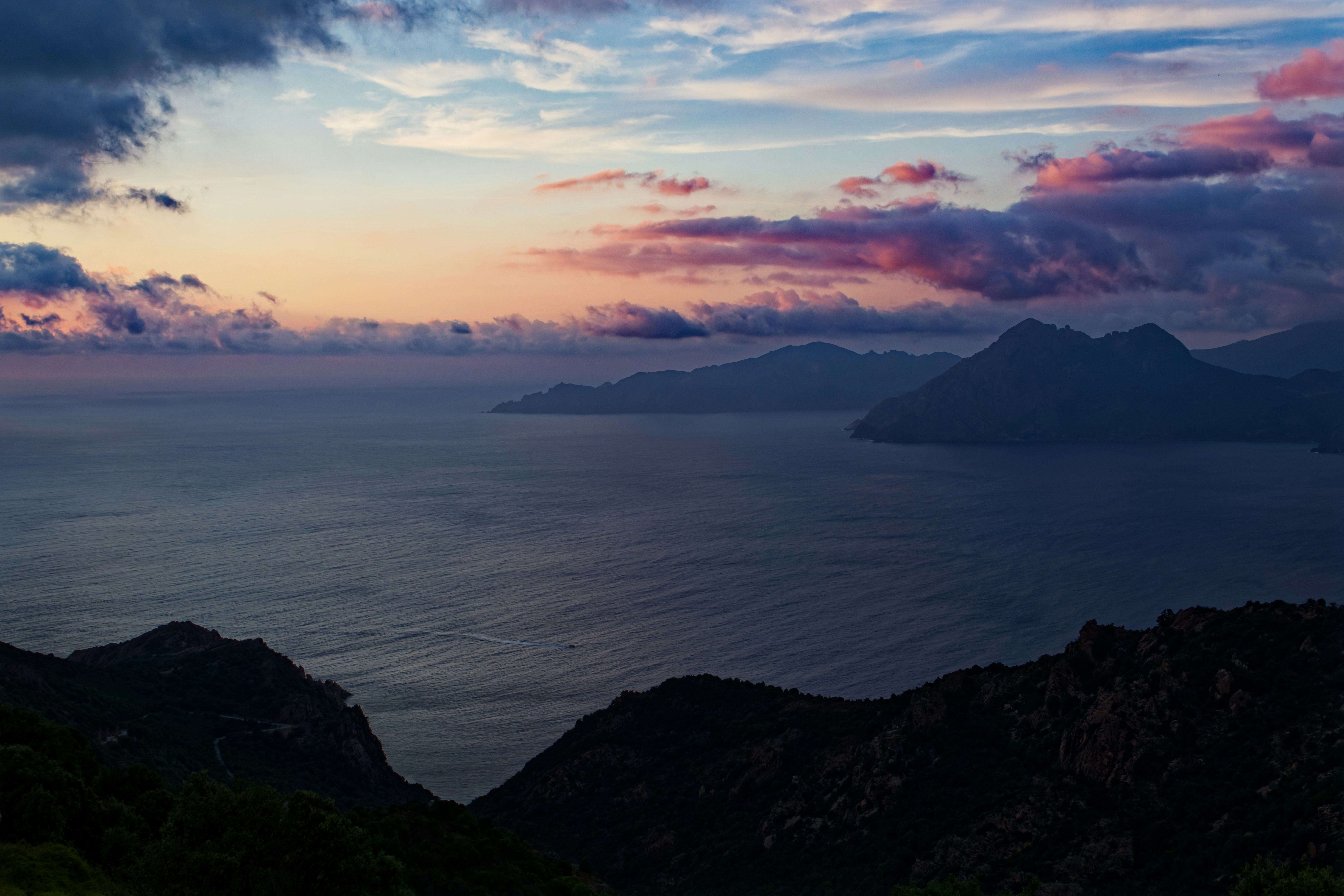 Twilight Crest Over the Serene Sea