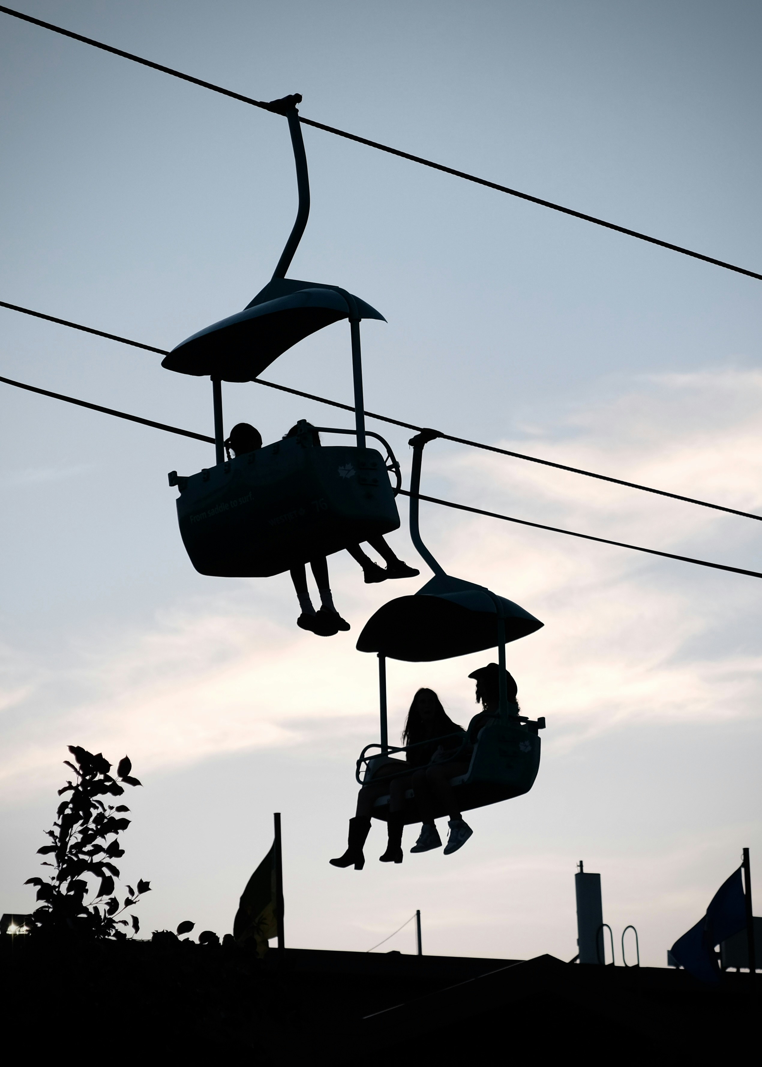 Riders in the Sky: Shadowed Silhouettes on a Cablecar Ride