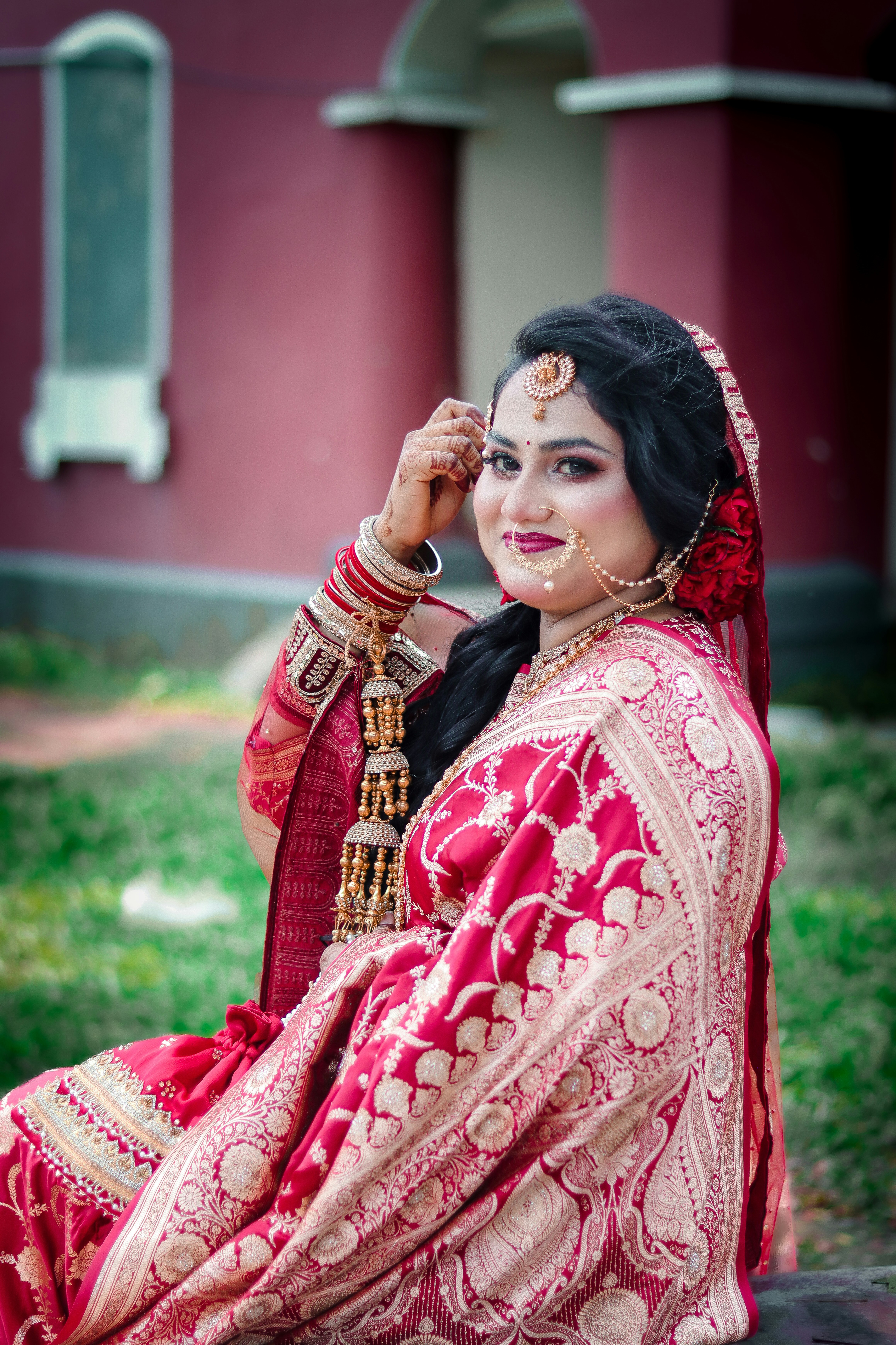 Graceful Bridal Gaze in Red and Gold