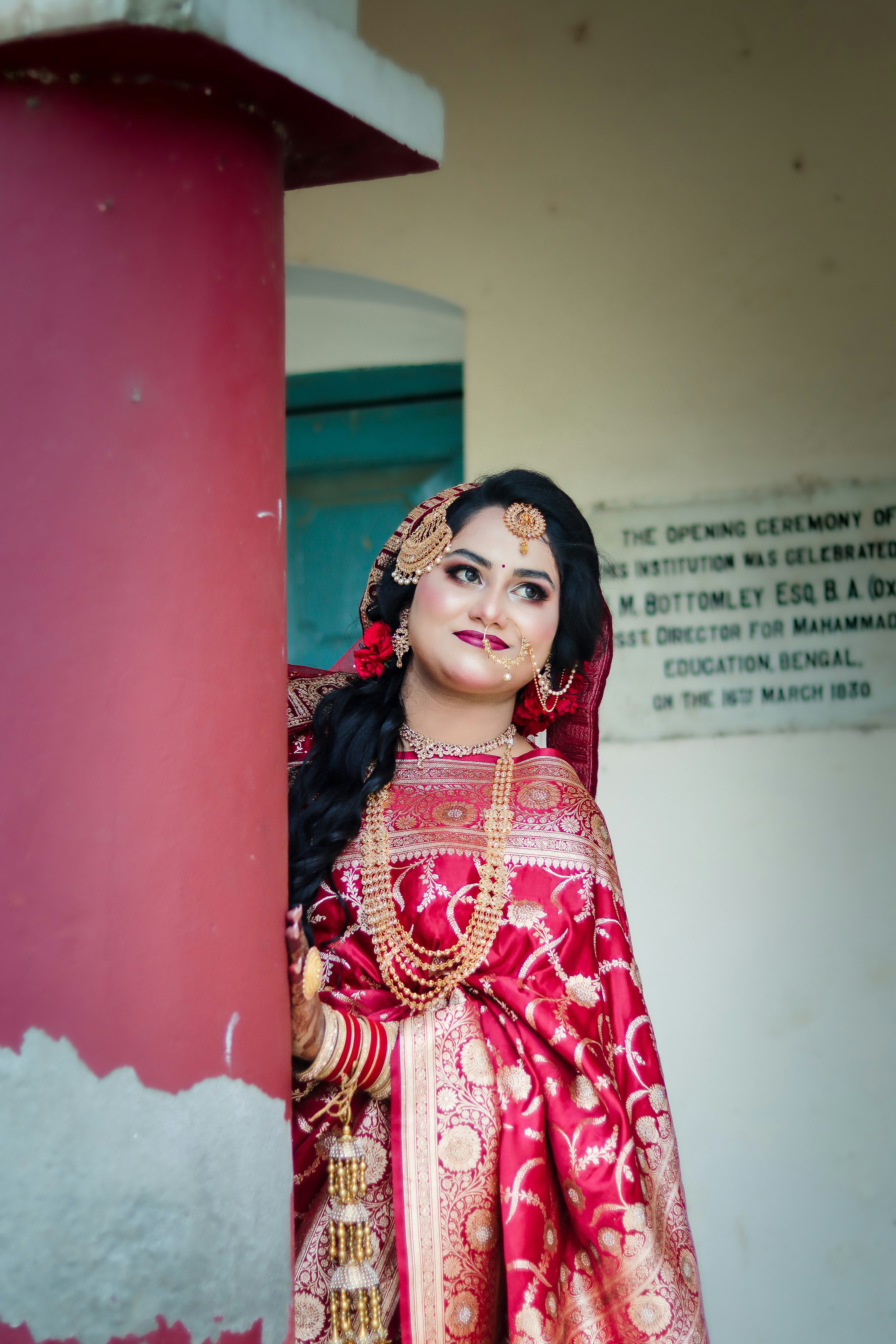 Elegance in Scarlet: A Bride Adorns Heritage Craft