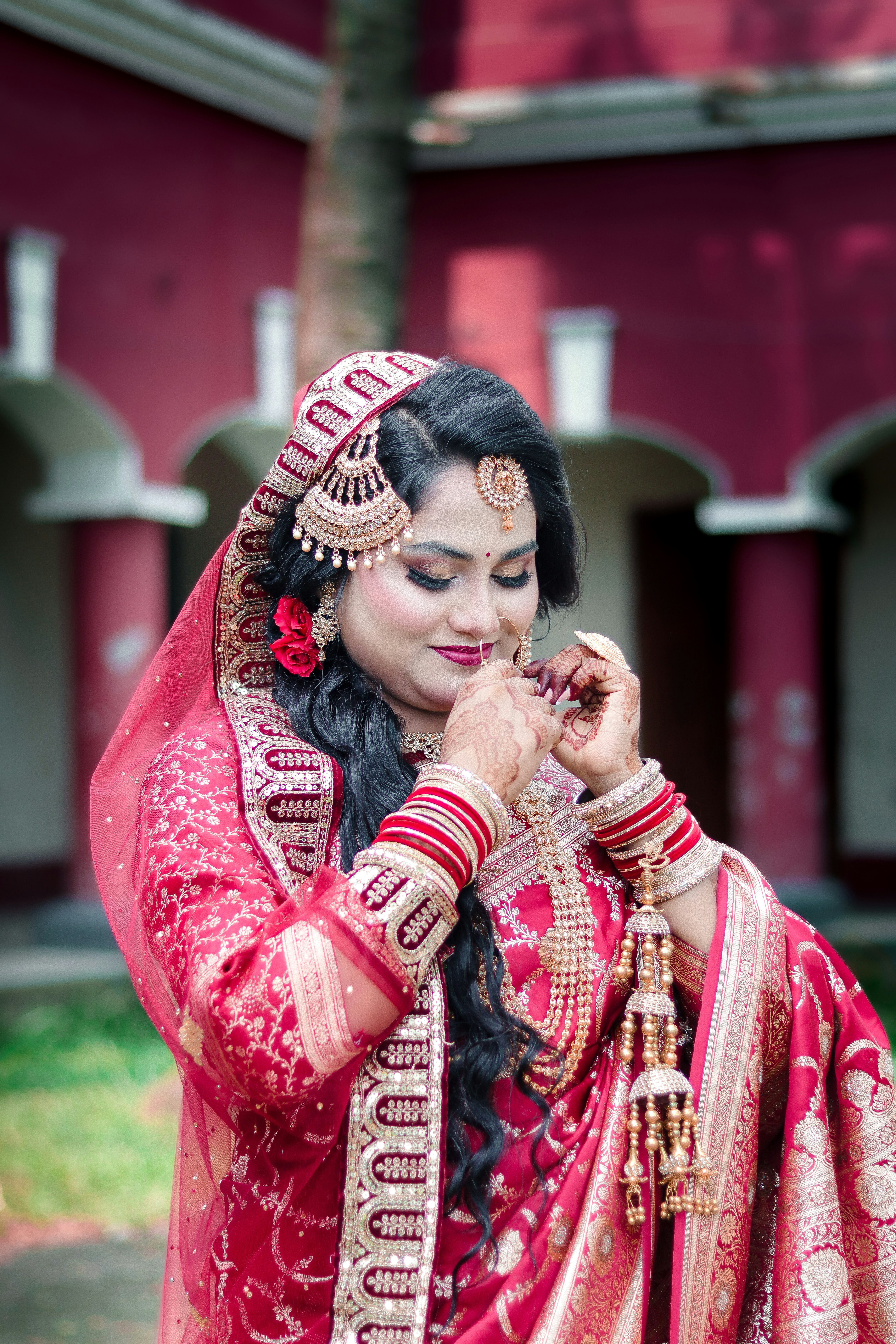 Bridal Radiance: A Moment of Quiet Joy in Red
