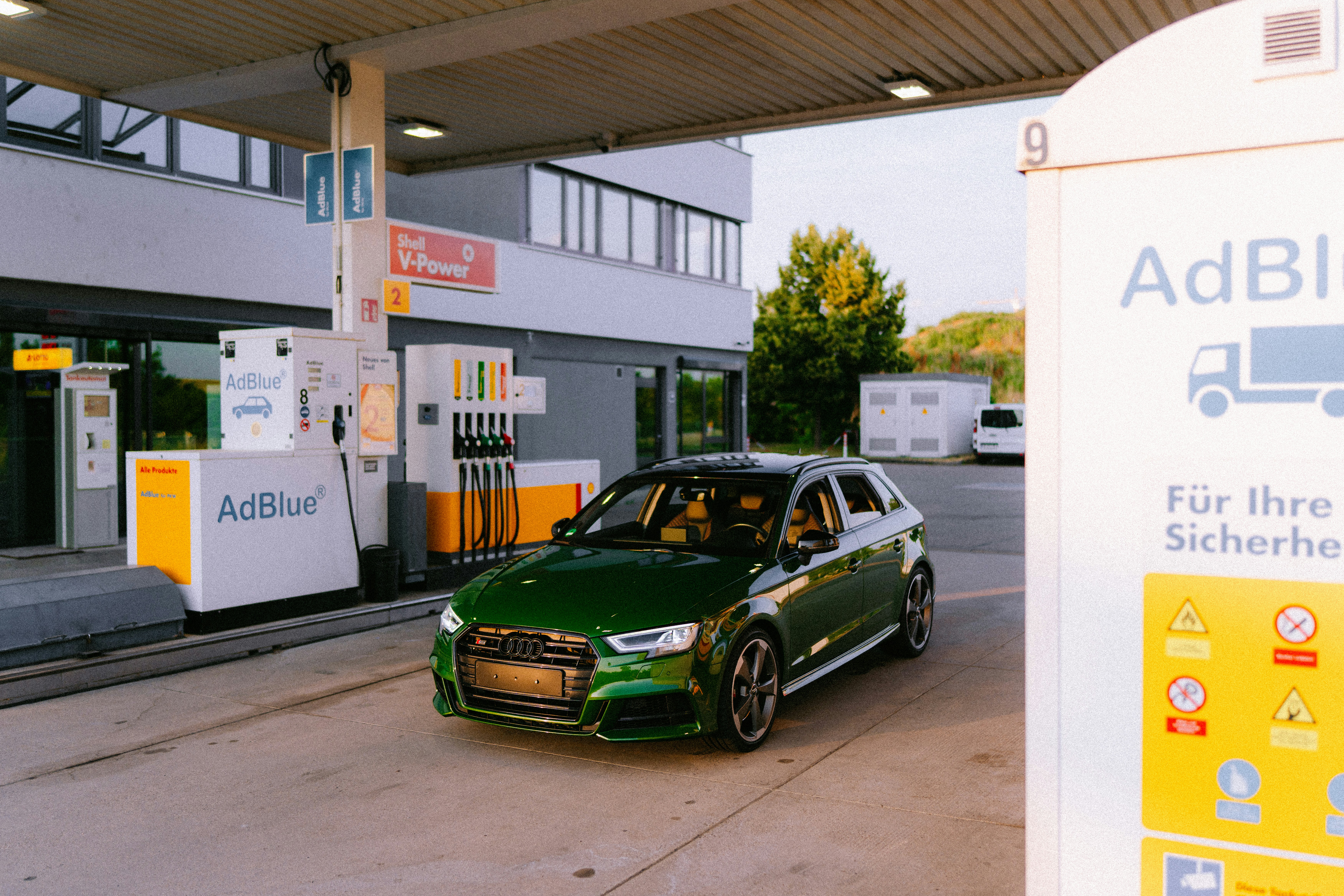 Green Audi at the Pump: A Quiet Moment of Refined Motion