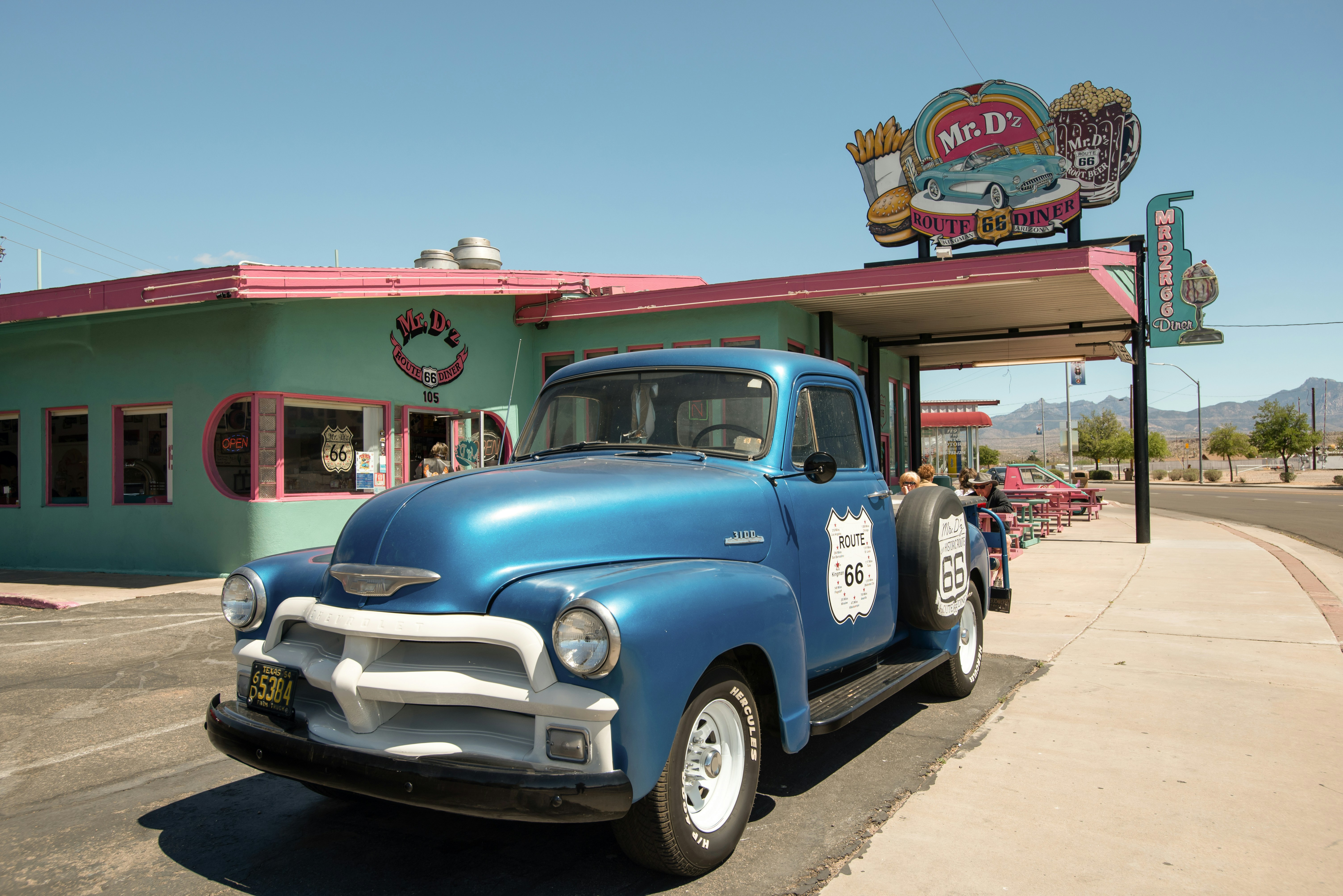 Blue Classic: a sunlit vintage pickup at Mr. Drippy's Drive-In