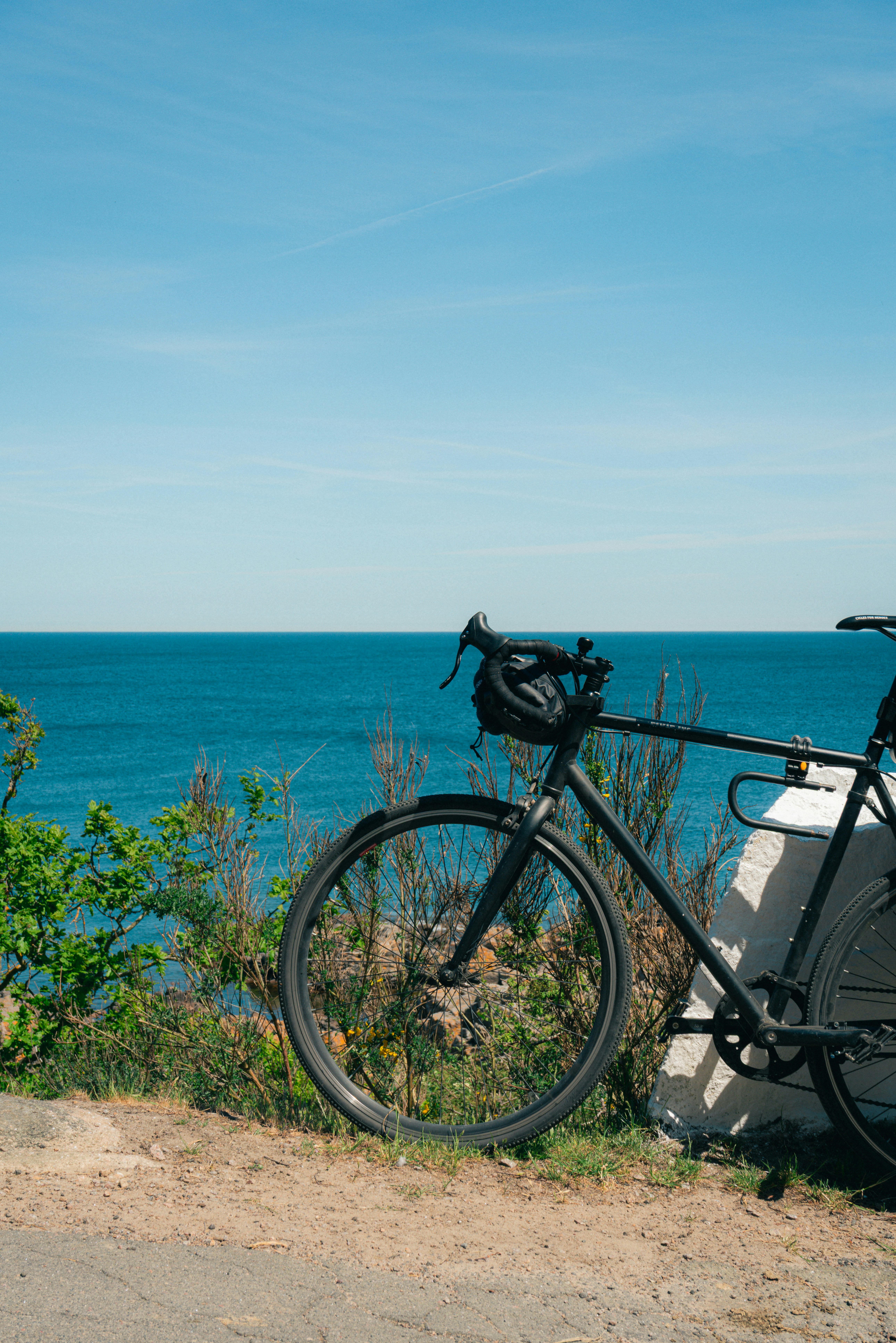 Bike Rest at a Cliffside Blue Horizon