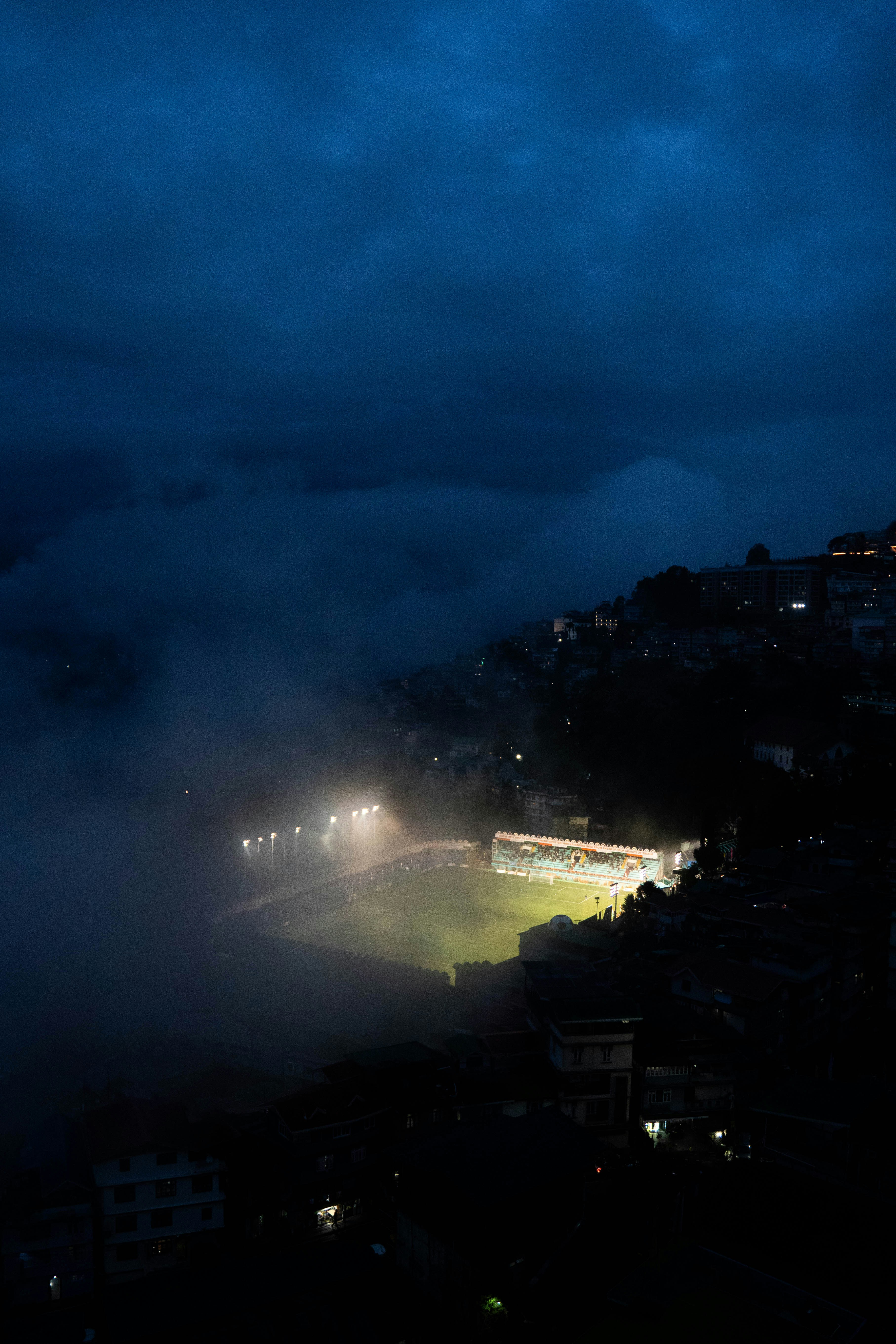 Luminous Stadium in a Misty Night